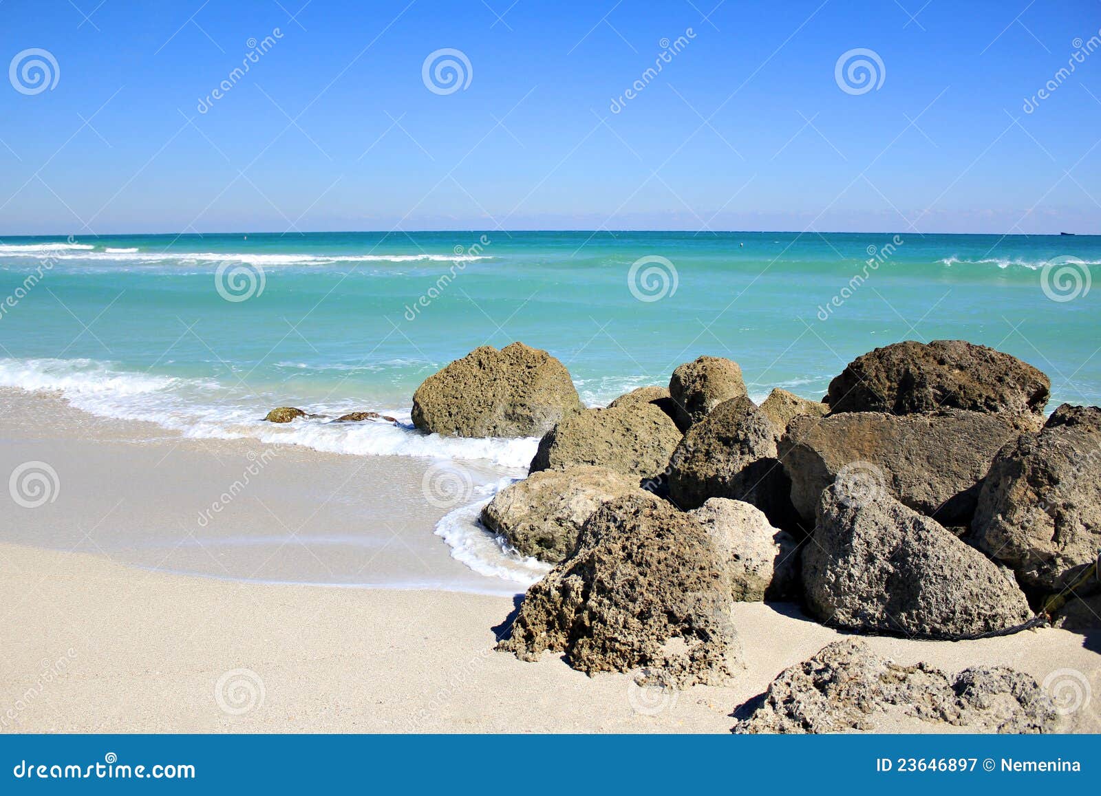 Rocks on the beach stock image. Image of sandy, coastline - 23646897