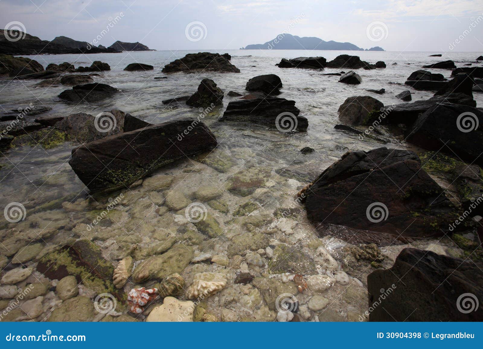 Rocks on beach stock photo. Image of beach, pool, tide - 30904398