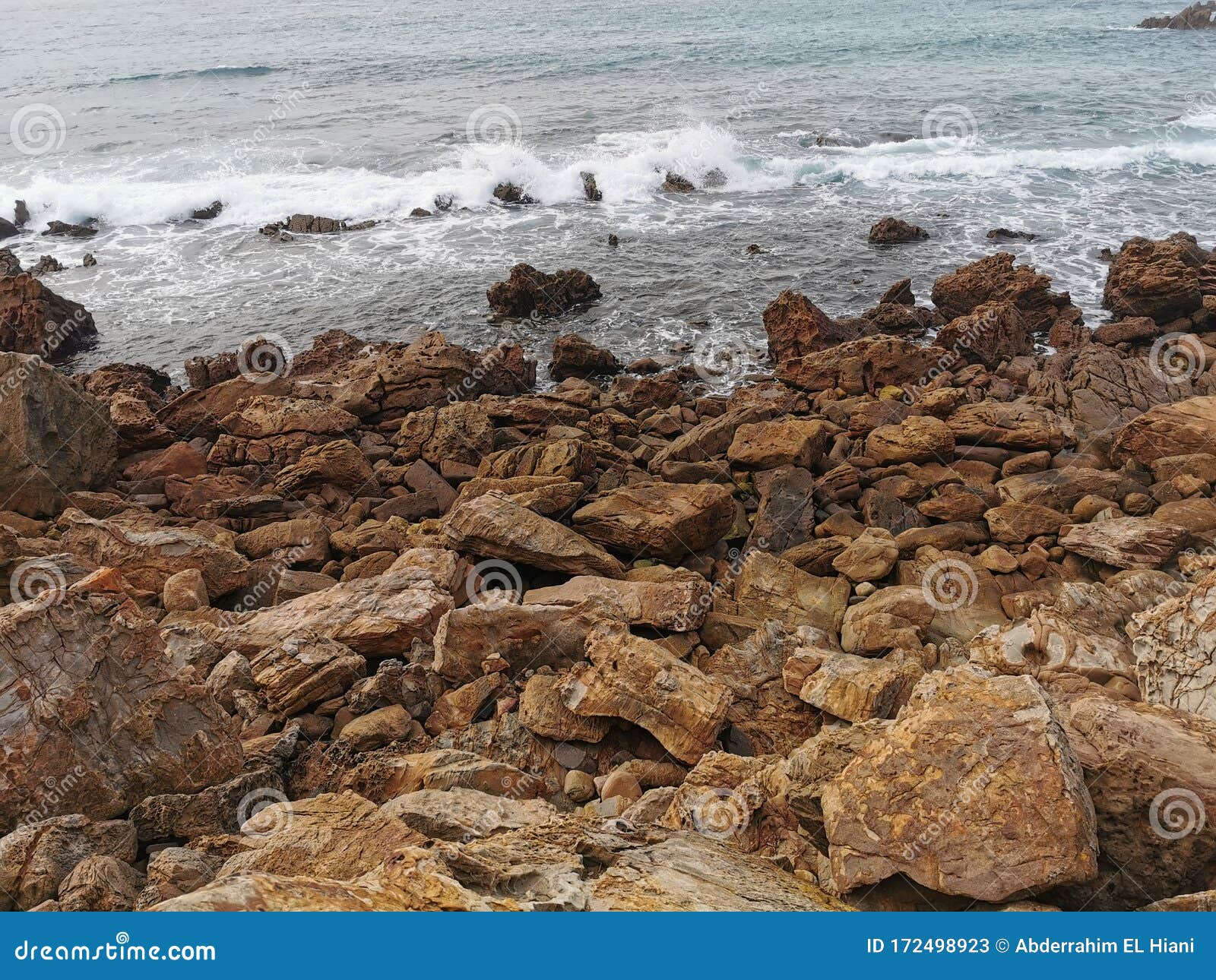 Rocks in beach stock image. Image of ocean, stone, rocks - 172498923