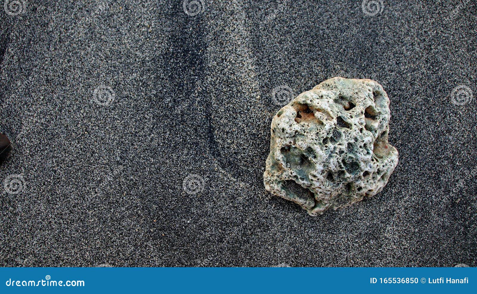 The Rocks on the Beach Sand are Gray in the Morning, with less Light ...