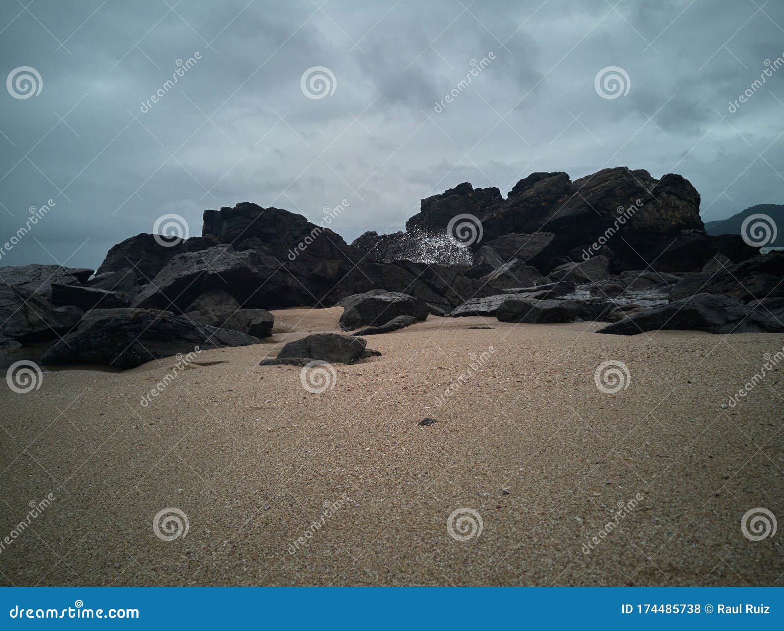 Rocks on the Beach after the Storm Stock Photo - Image of blue, light ...