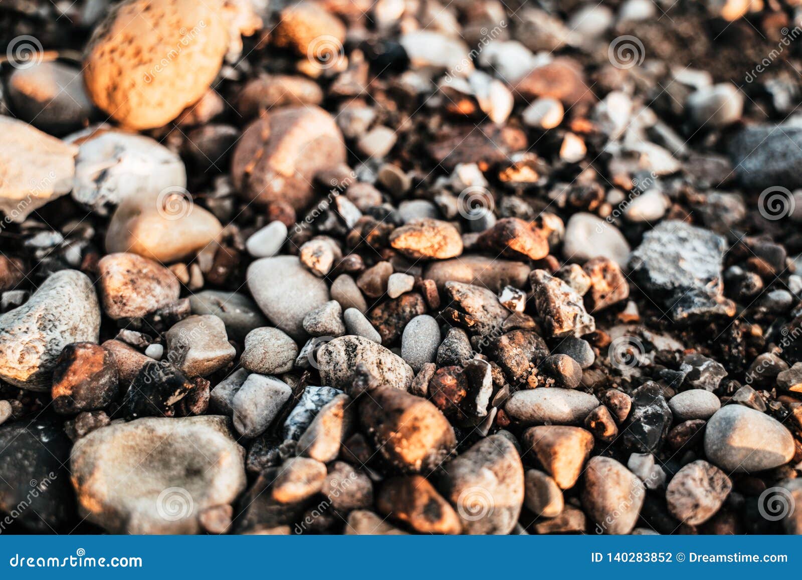 Rocks on the beach stock photo. Image of nature, smooth - 140283852