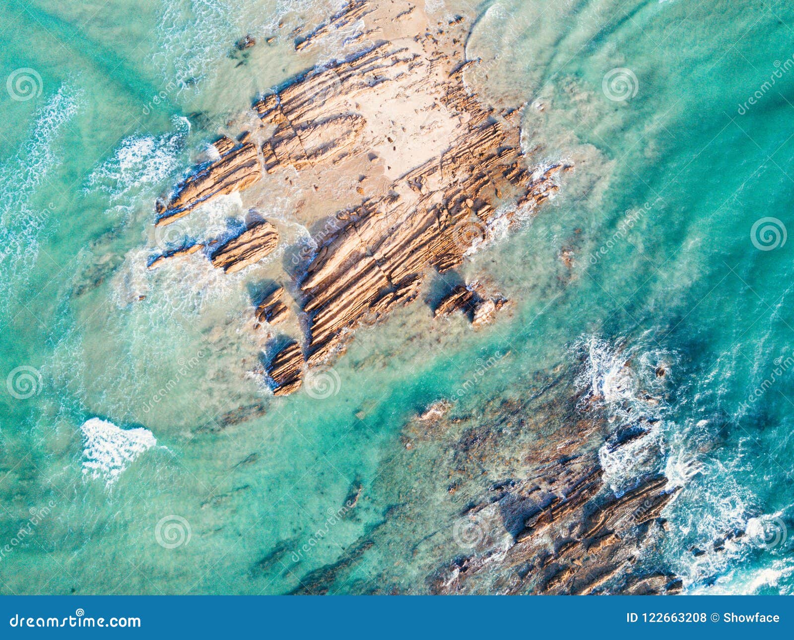Rocks Being Swallowed Up by the Ocean Stock Photo - Image of waves ...
