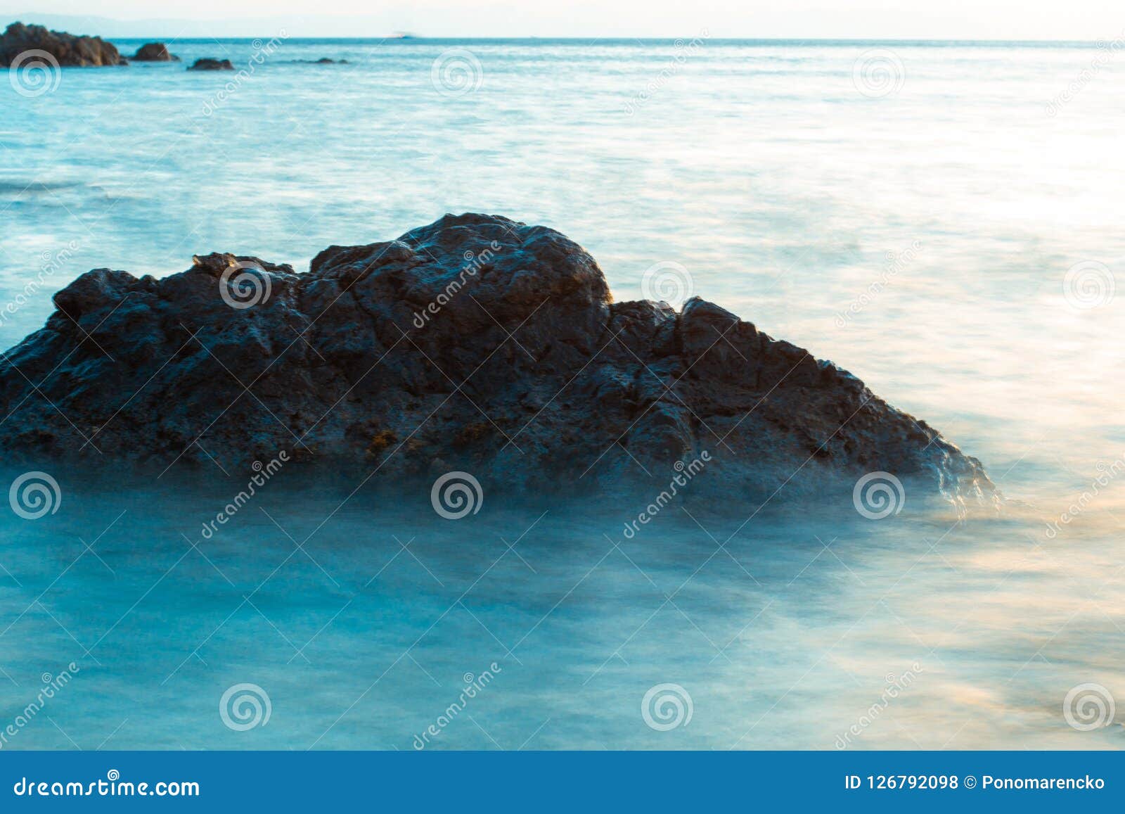 Rocks in the Blue Sea Waves Stock Photo - Image of scene, light: 126792098