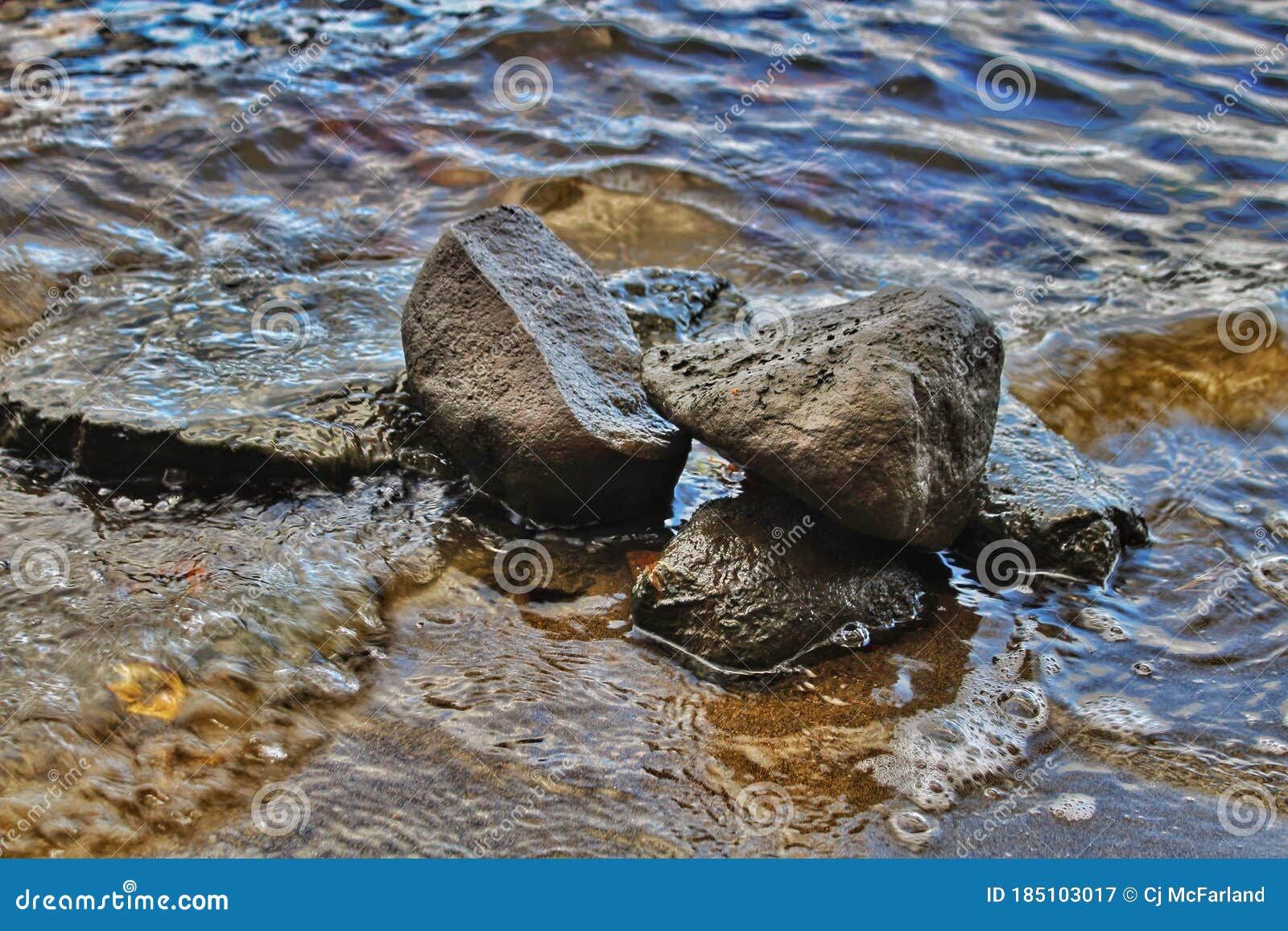 Rocks with Calming Ripples in the Water Stock Image - Image of leaf ...