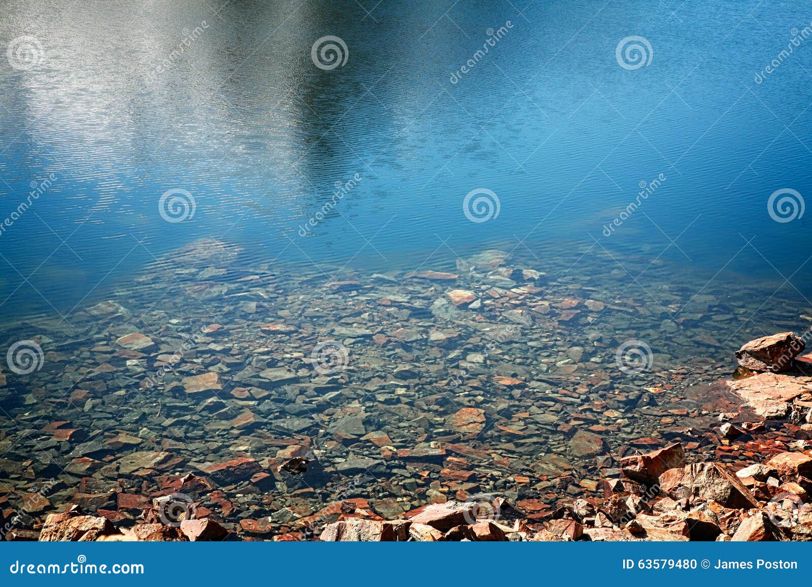 Rocks in clear water stock photo. Image of clear, rocks - 63579480