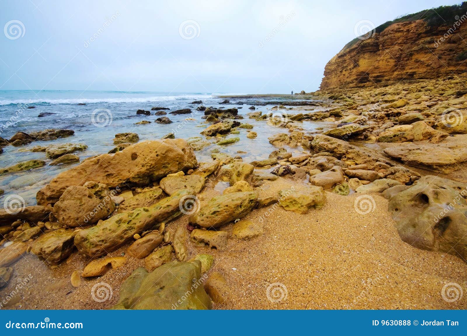 Rocks, cliff and beach stock photo. Image of layer, tide - 9630888
