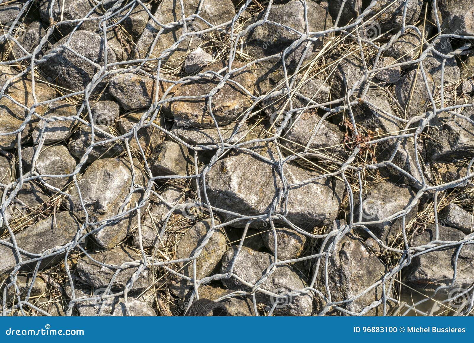 Rocks covered Wire mesh stock photo. Image of view, stones - 96883100