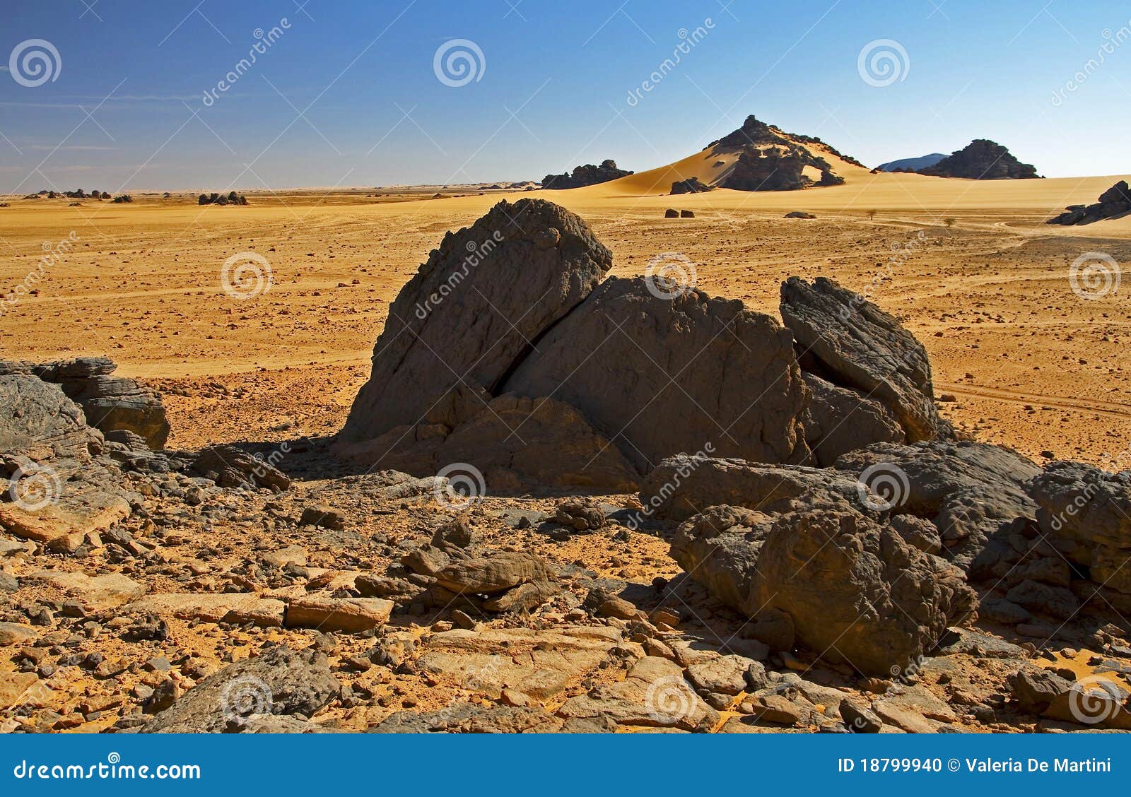 Rocks in desert landscape stock photo. Image of akakus - 18799940