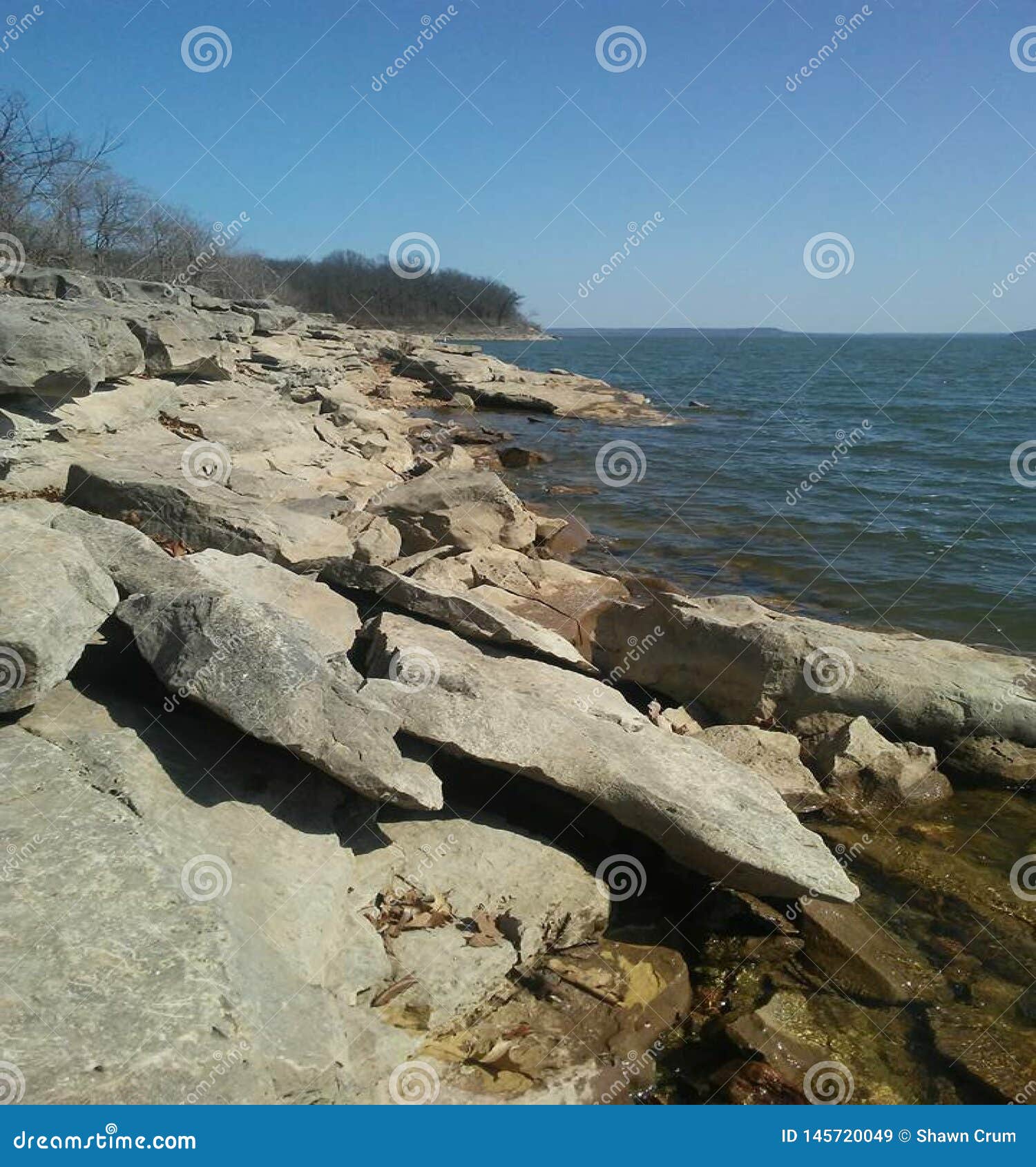 Rocks on the Edge of the Lake Stock Image - Image of lake, edge: 145720049