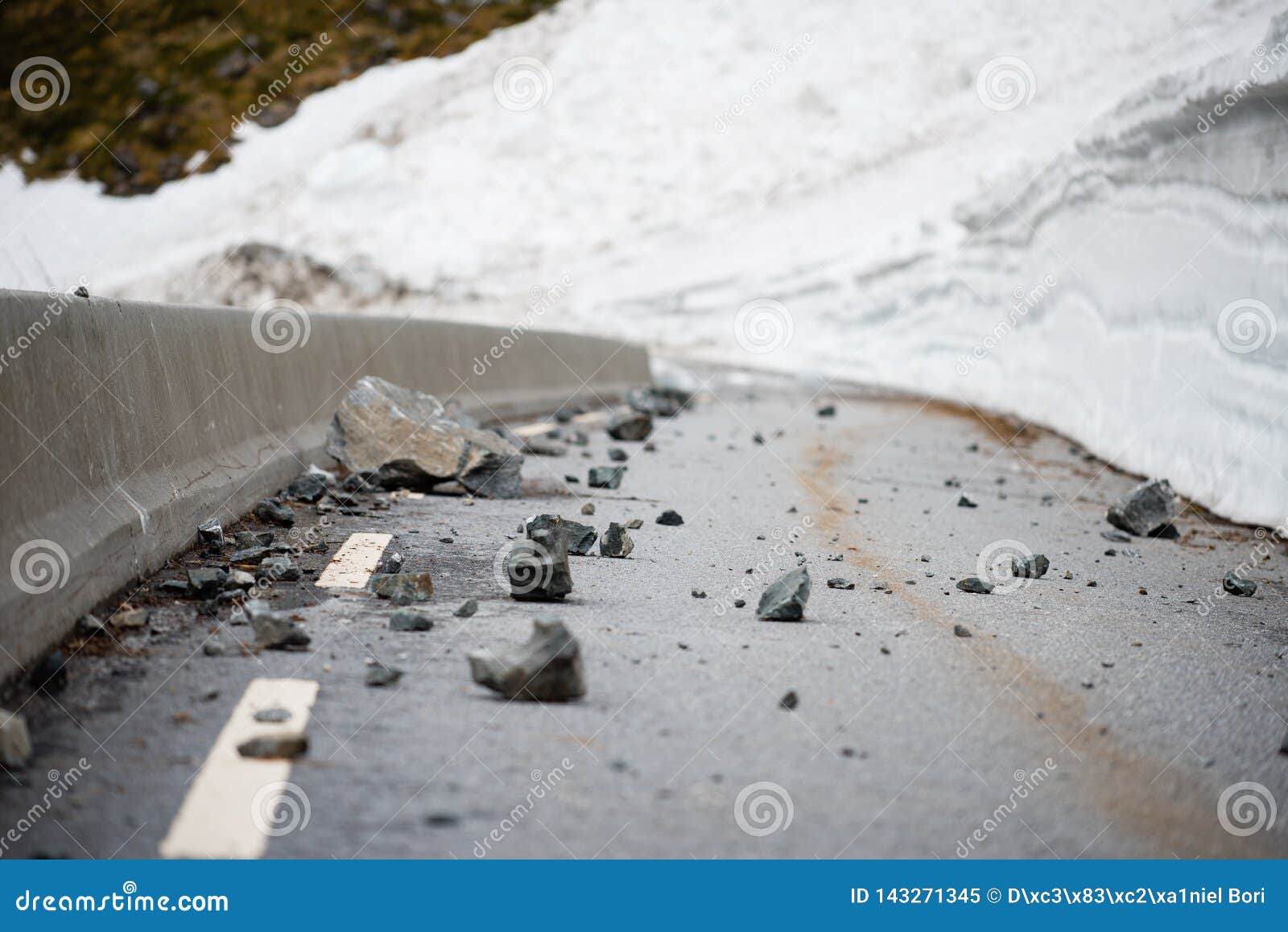 Rocks fallen on a road stock image. Image of drive, reason - 143271345