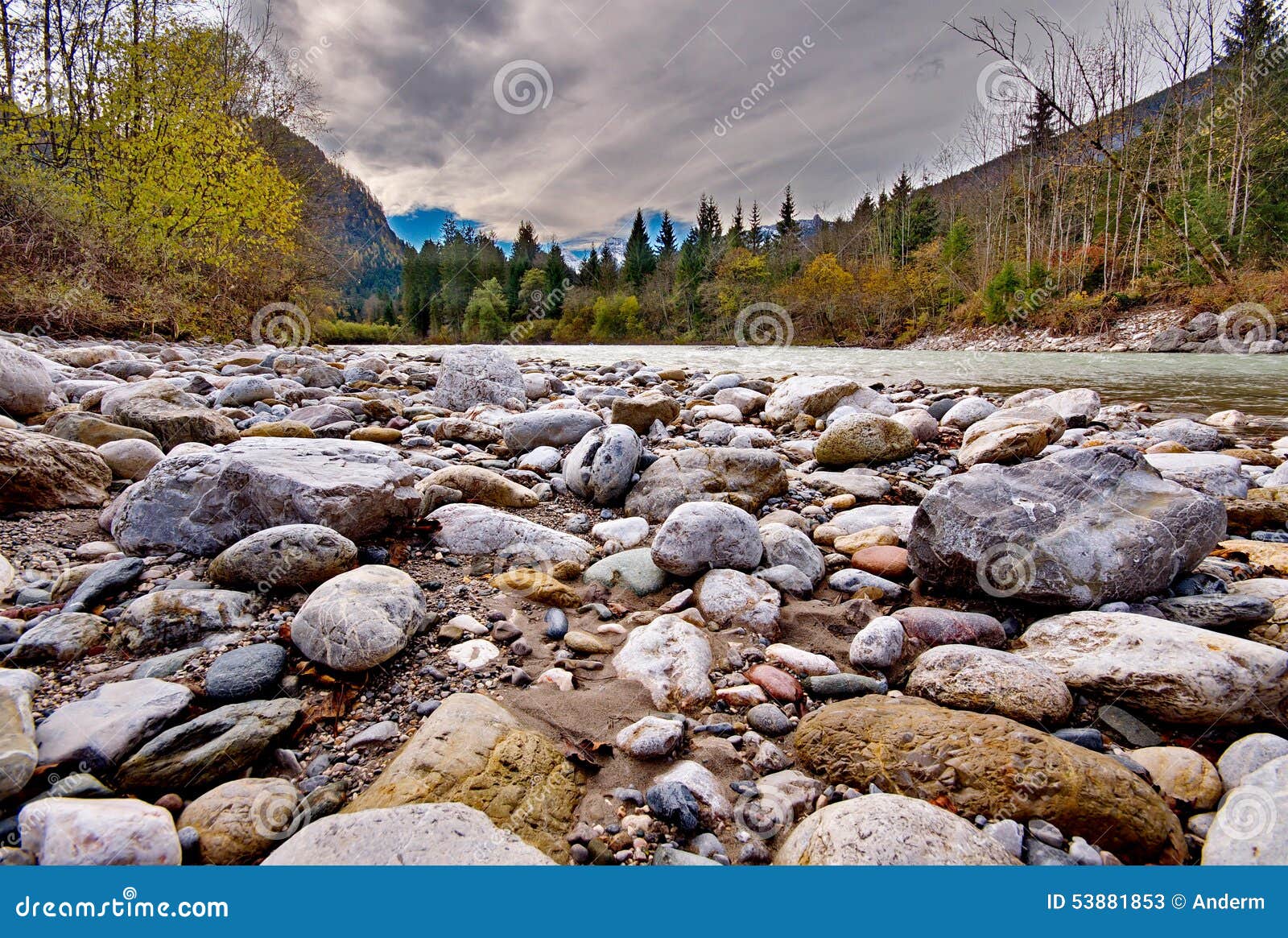 Rocks in the flowing river stock image. Image of spring - 53881853