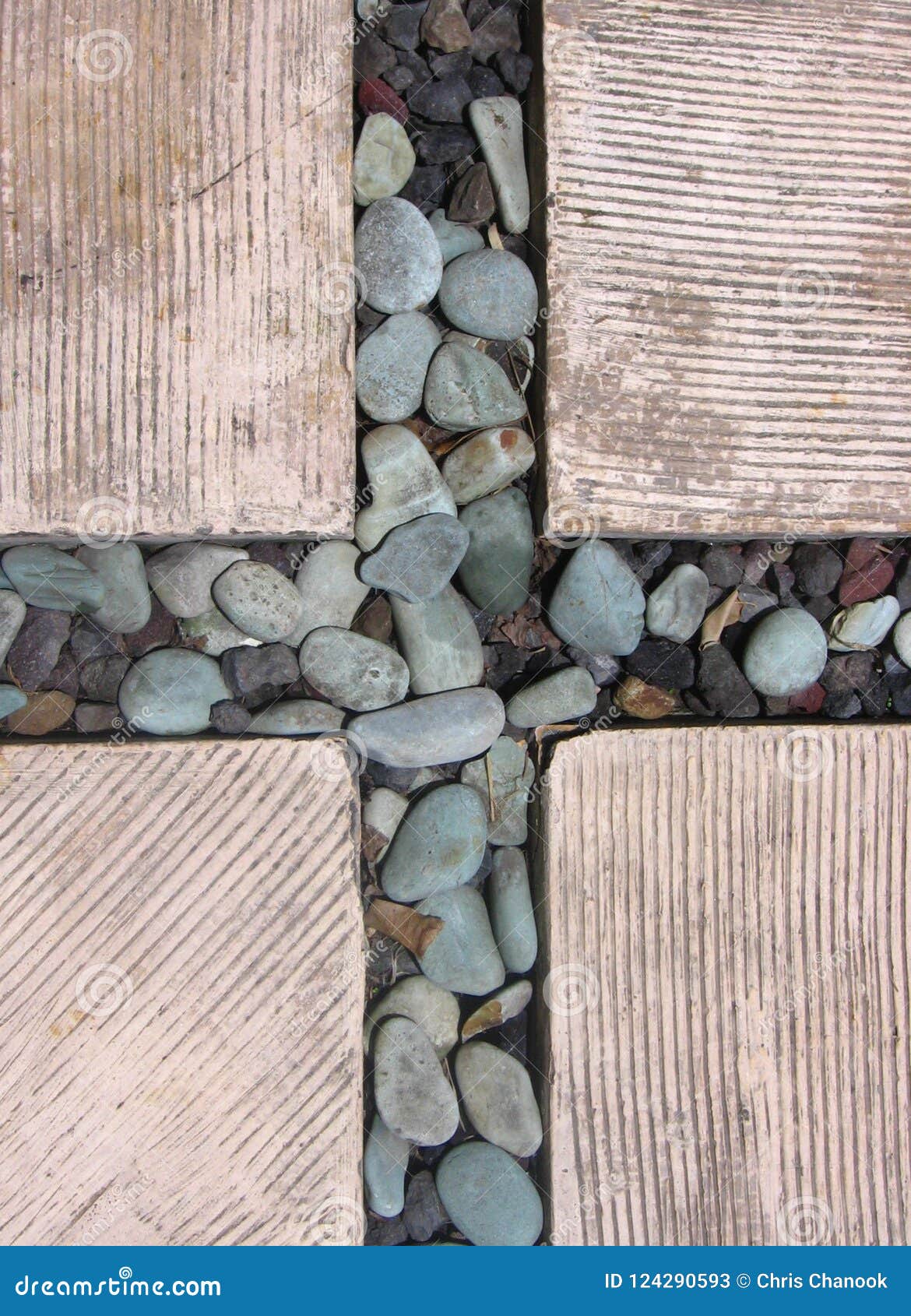 Rocks in the Formation of a Cross Set within Patterned Bricks Stock ...
