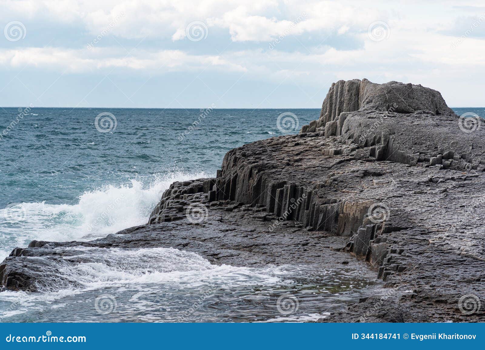 Rocks Formed by Columnar Basalt among the Sea Surf, Cape Stolbchaty on ...