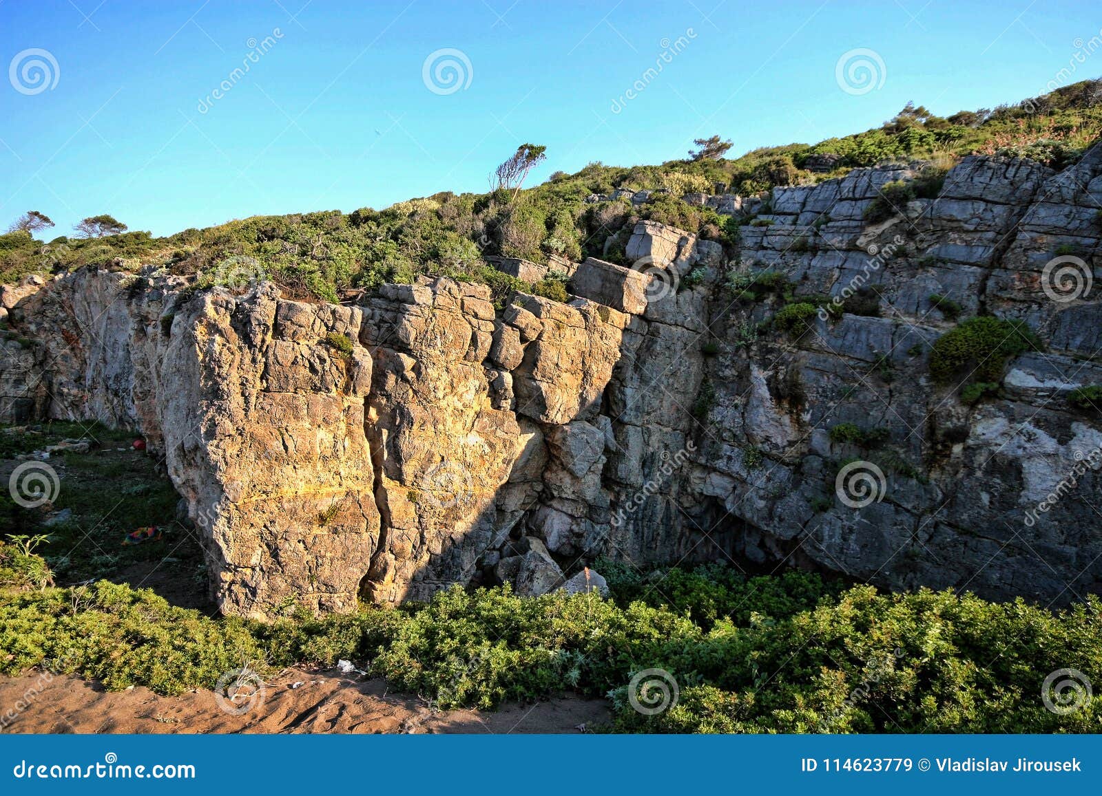 Rocks on the Greek coast stock image. Image of greece - 114623779