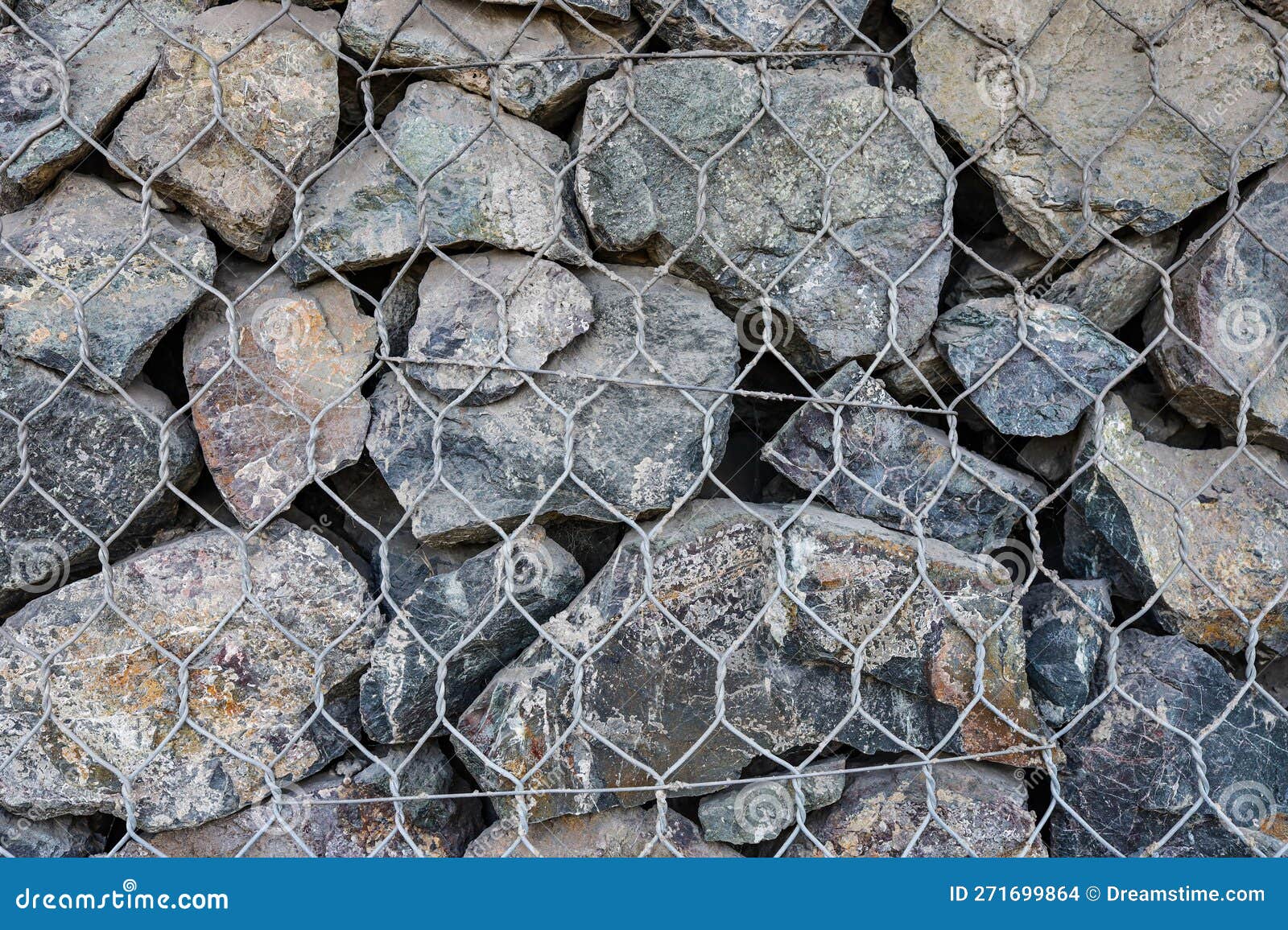 Rocks Held Back by a Wire Fence Stock Photo - Image of boulder, soil ...