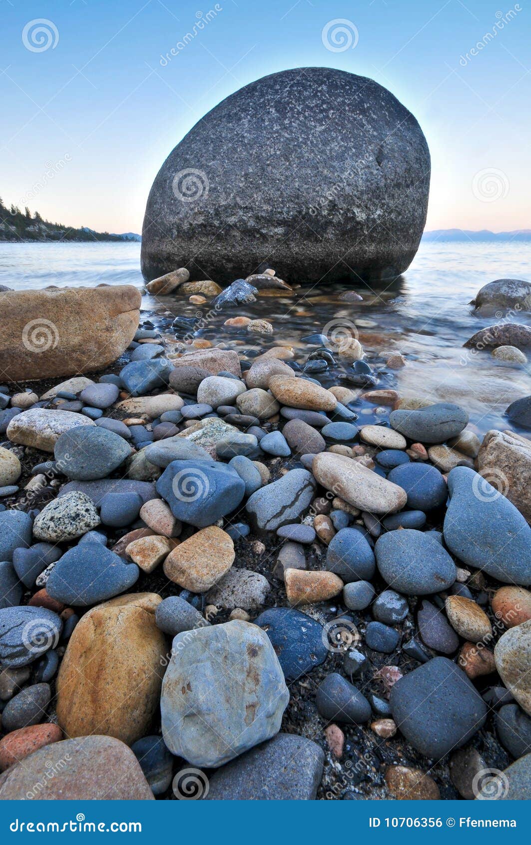 Rocks by a lake stock photo. Image of pebble, material - 10706356