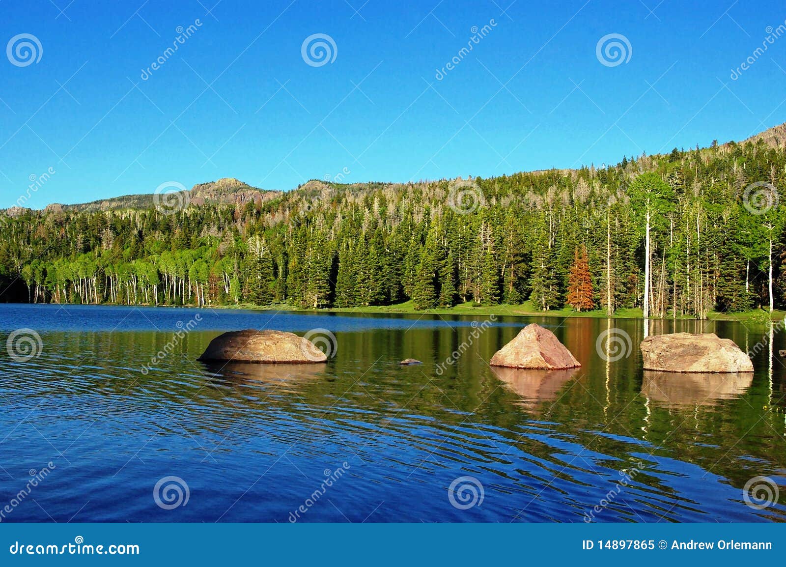 Rocks in Lake stock image. Image of blue, outdoors, water - 14897865