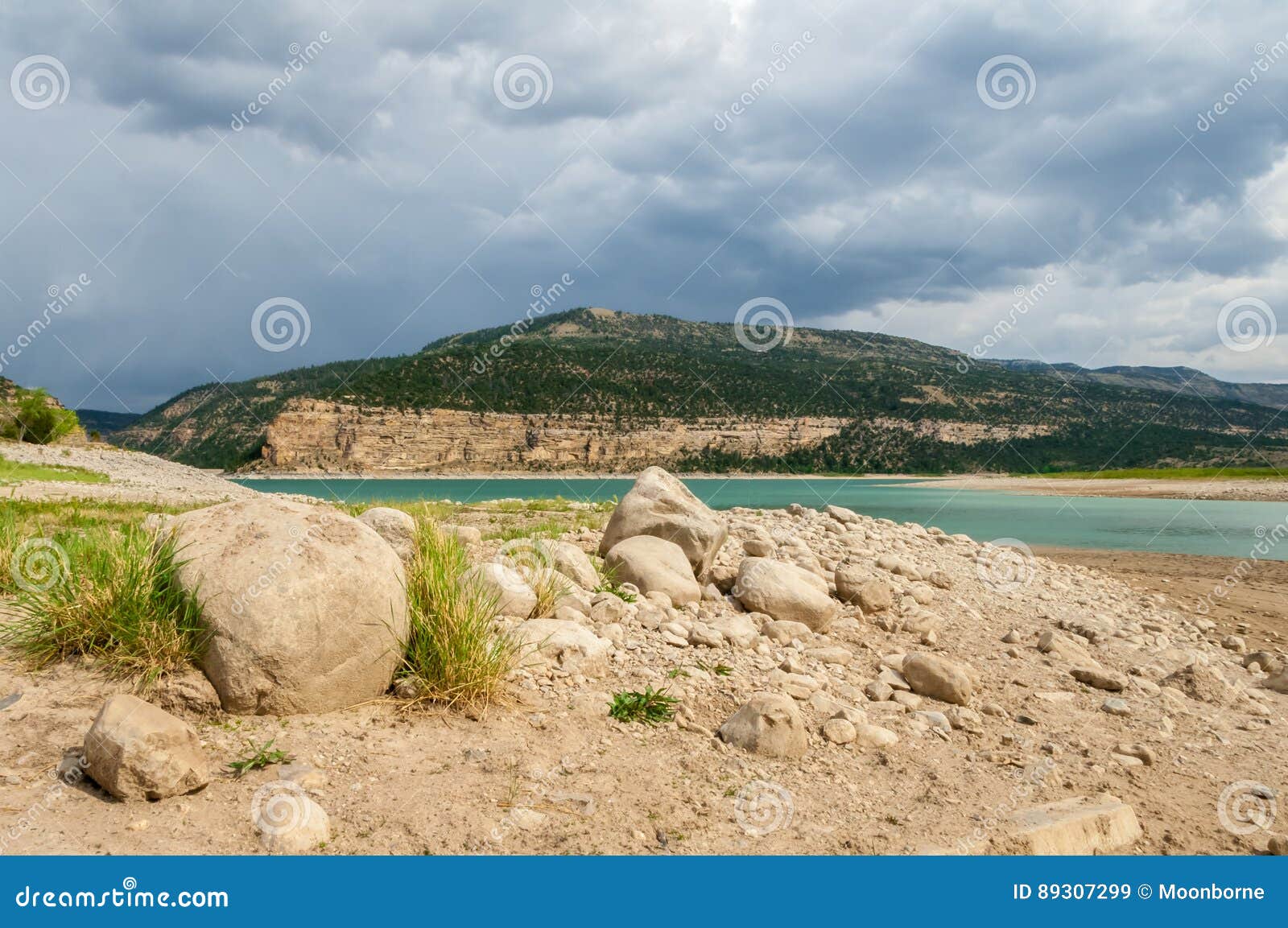 Rocks by the Lake stock image. Image of cloud, geography - 89307299