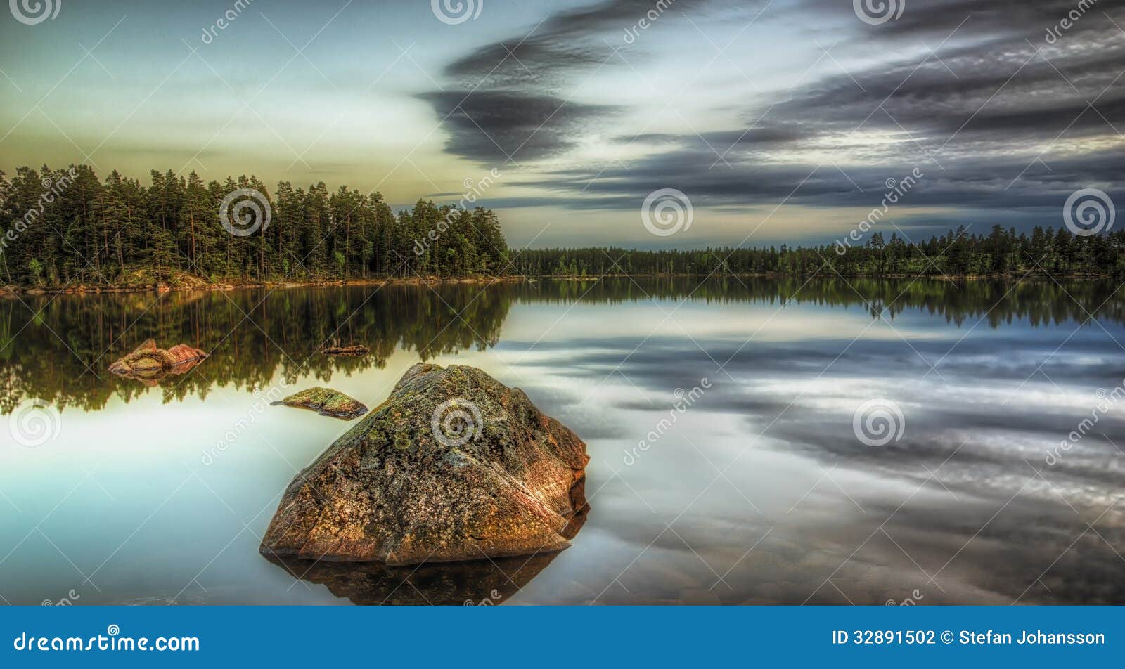 Rocks in the lake stock photo. Image of water, seascape - 32891502