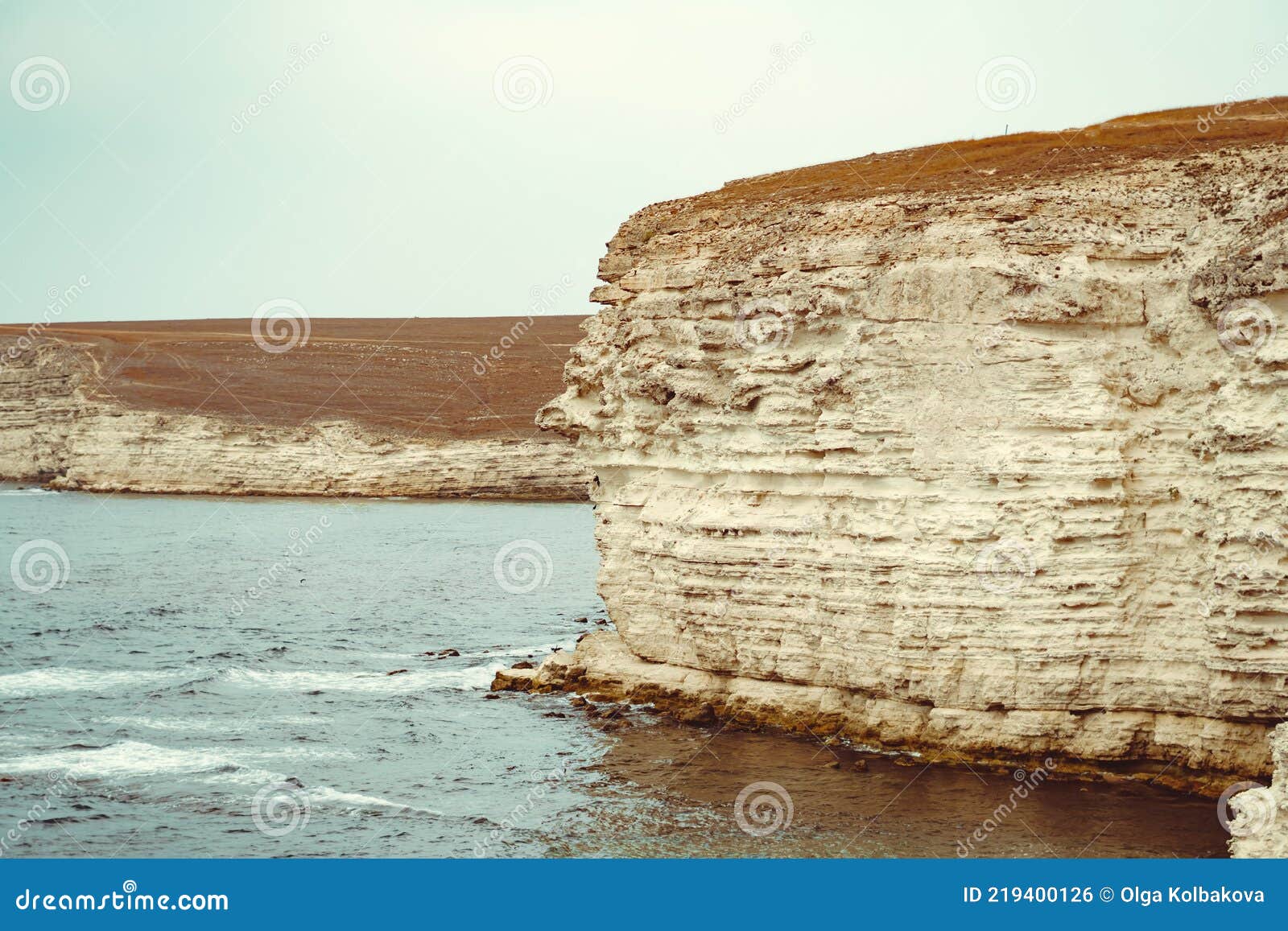 Rocks ledges by the sea stock photo. Image of horizontal - 219400126