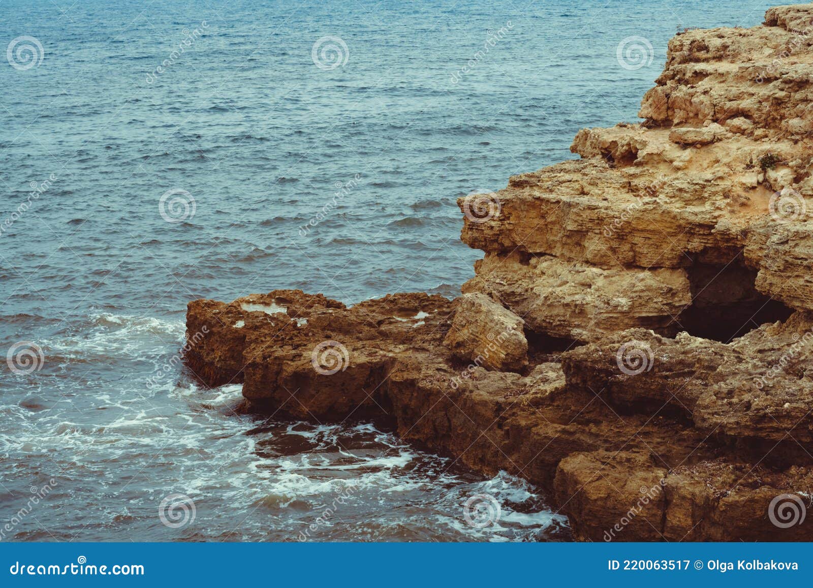 Rocks ledges by the sea stock image. Image of beach - 220063517