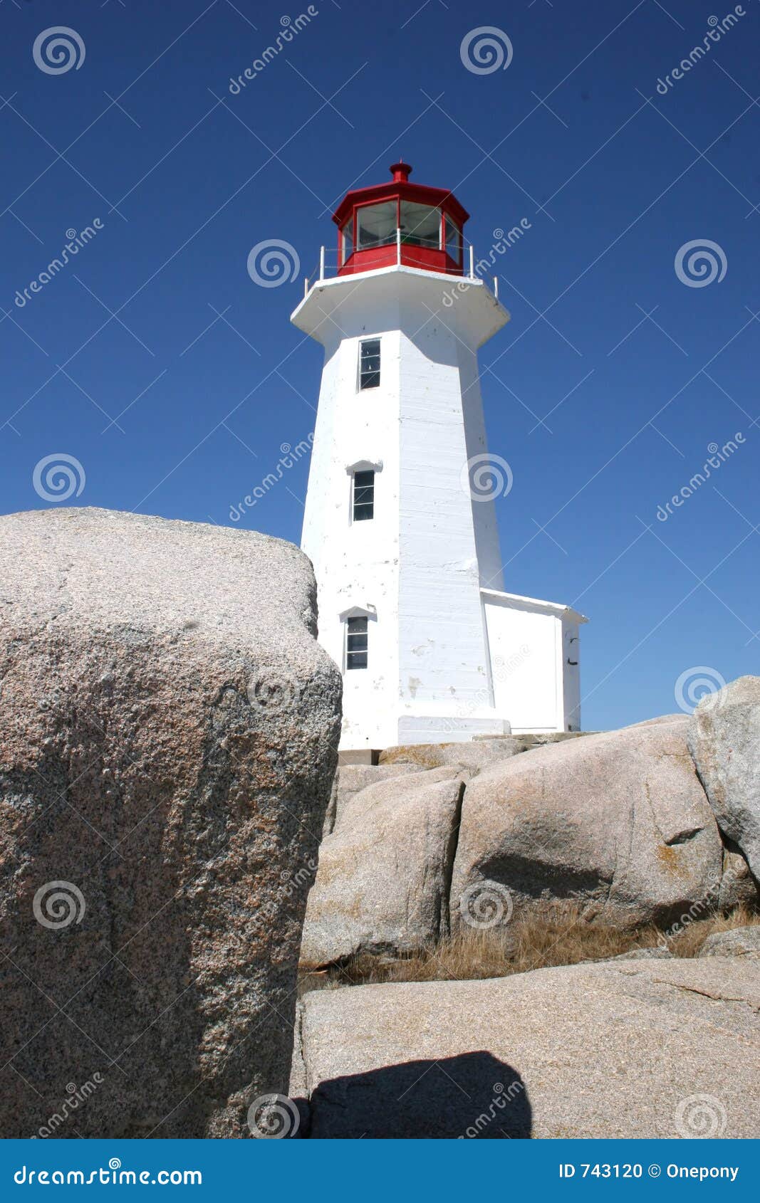 Rocks & Lighthouse stock photo. Image of scotia, peggys - 743120