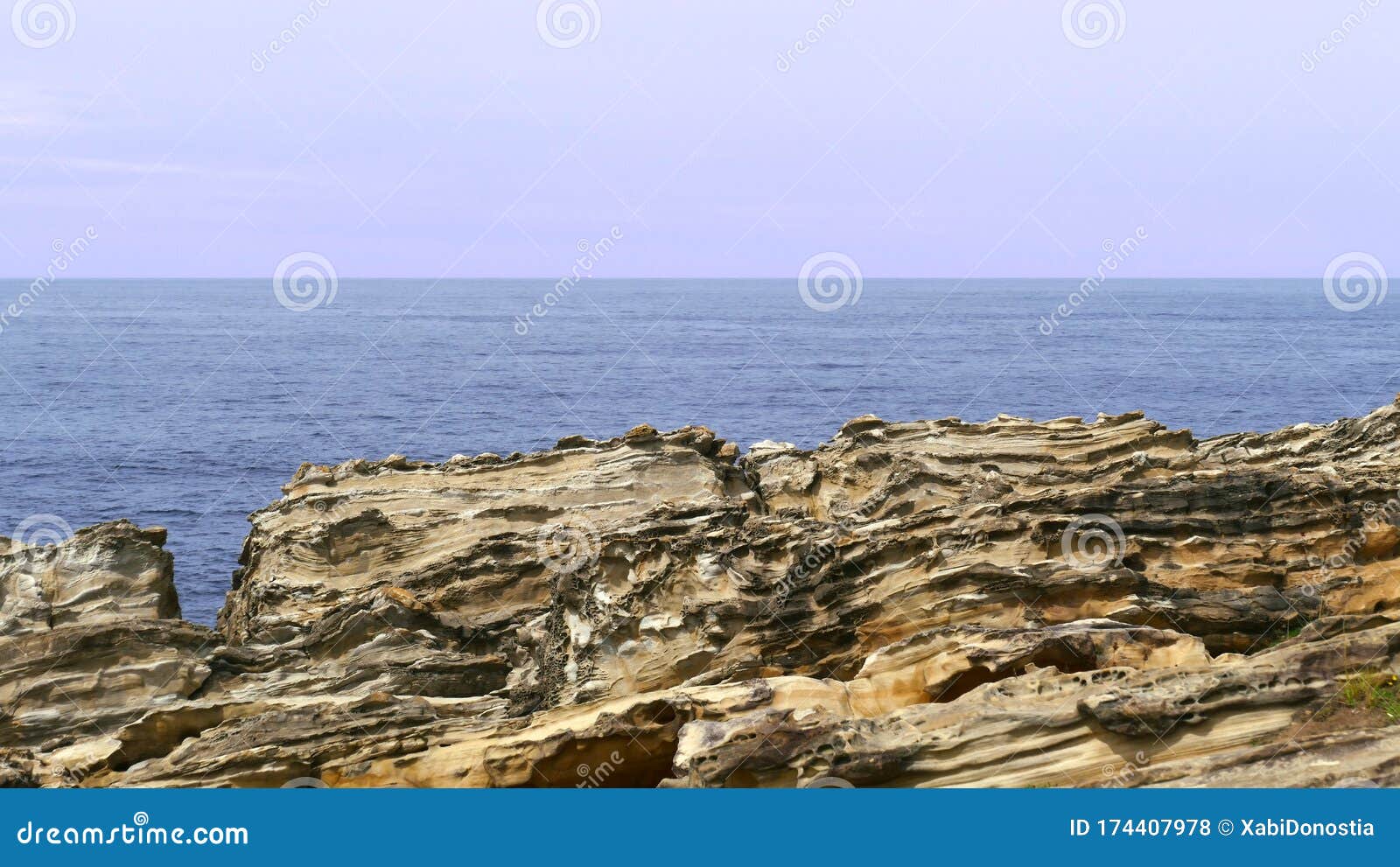 Rocks and Limestone Eroded on the Coast of the Sea Stock Photo - Image ...