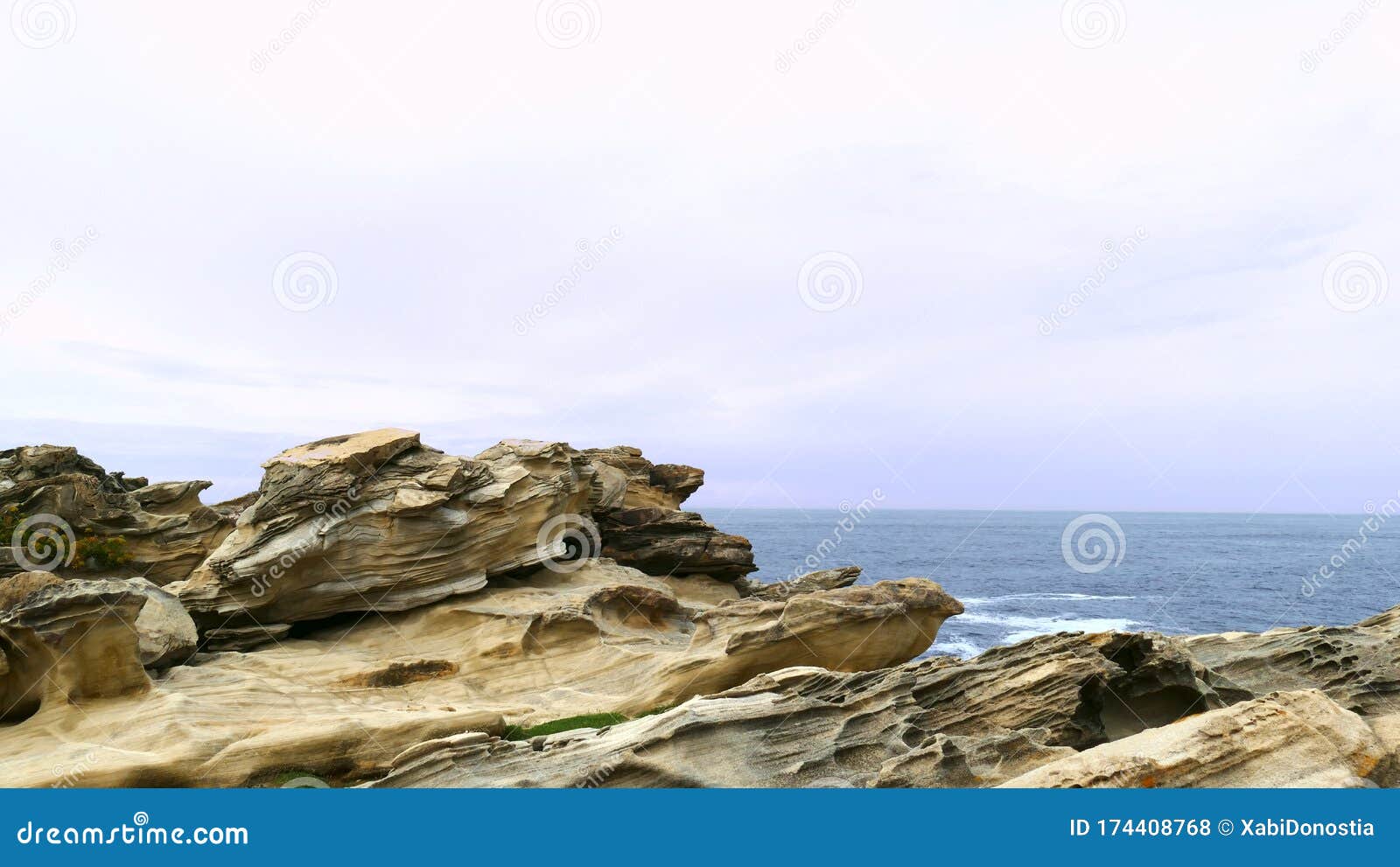 Rocks and Limestone Eroded on the Coast of the Sea Stock Photo - Image ...