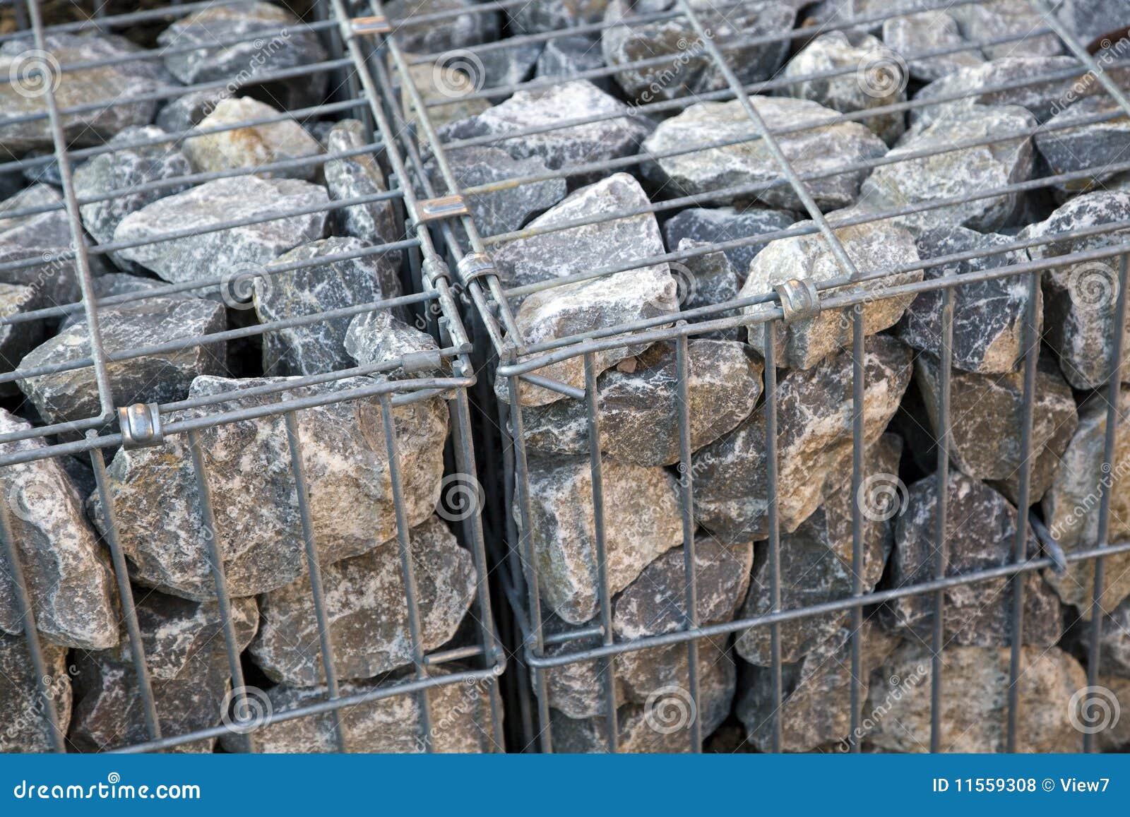 Rocks in a metal cage stock photo. Image of control, rock - 11559308