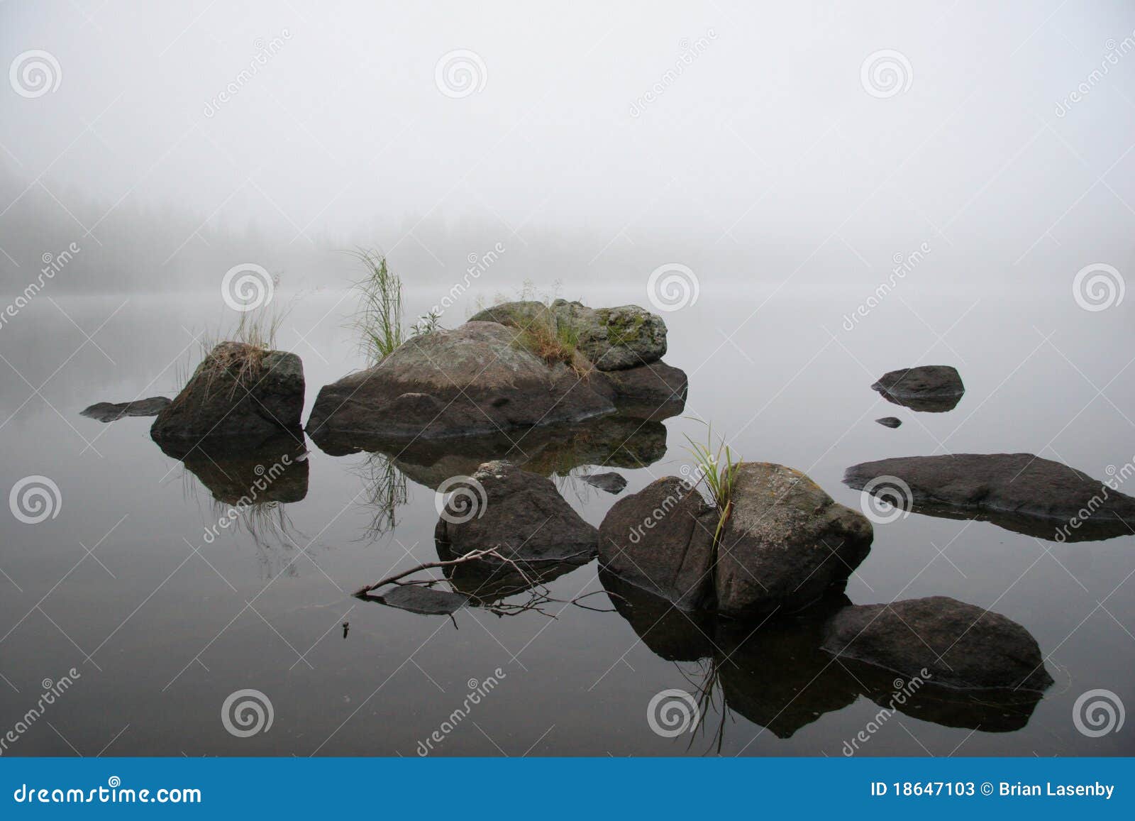 Rocks on Mist Shrouded Lake Stock Image - Image of ontario, rocks: 18647103