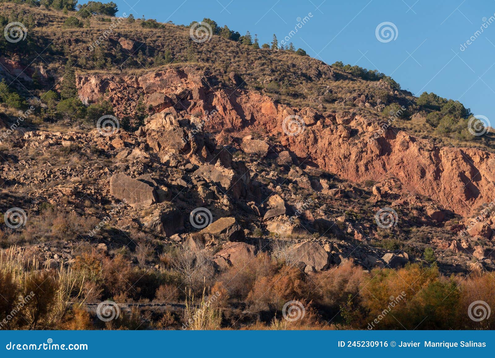 Rocks on a mountainside stock photo. Image of stone - 245230916