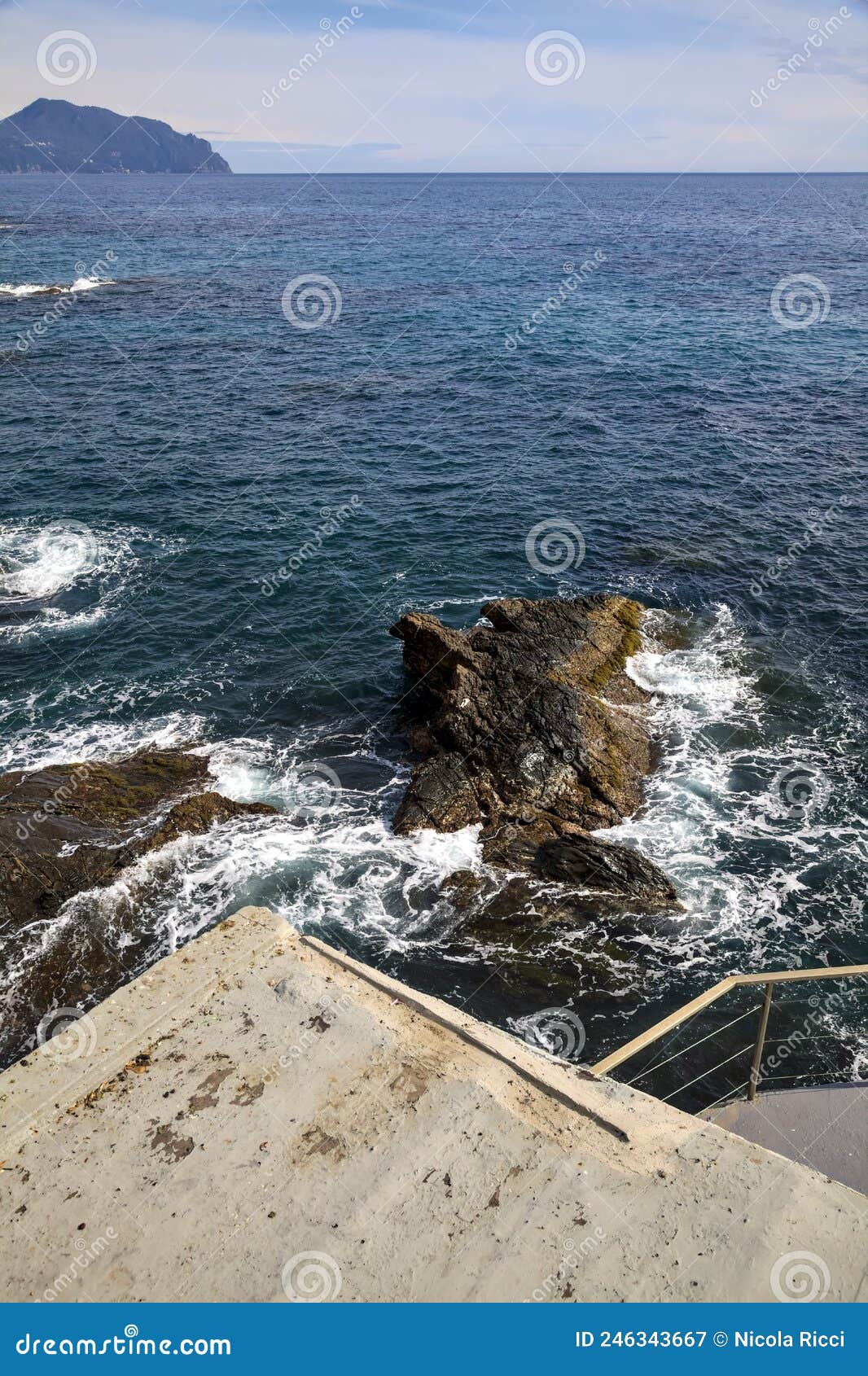 Rocks Next To a Cliff by the Sea on a Sunny Day Stock Image - Image of ...