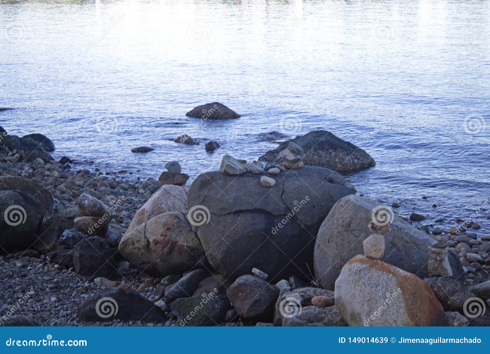 Rocks by Peaceful Sea Making Where the Shore Starts Stock Image - Image ...