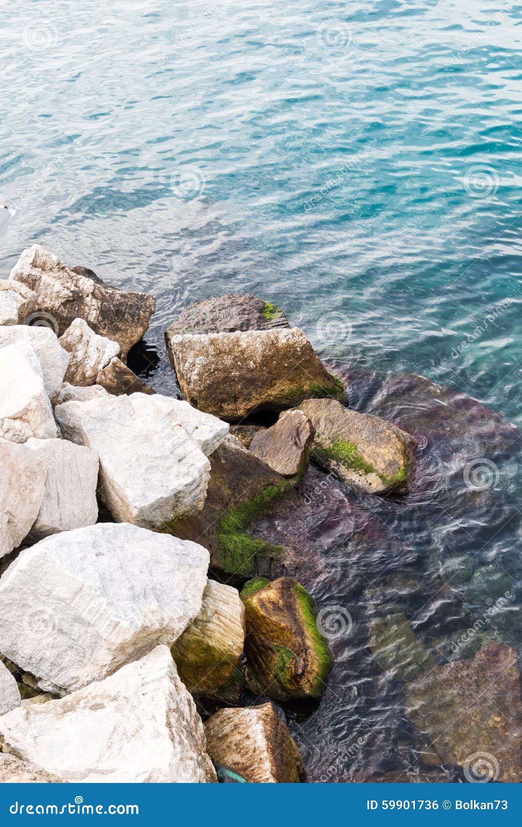 Rocks of the port stock photo. Image of coast, pier, ionian - 59901736