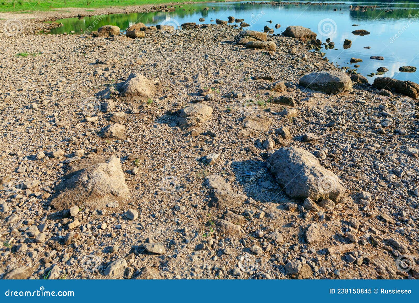 Rocks on the river bank stock image. Image of scenic - 238150845