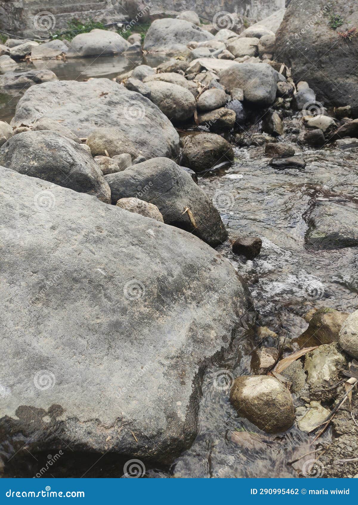 Rocks in the River Flow Under the Waterfall Stock Photo - Image of ...