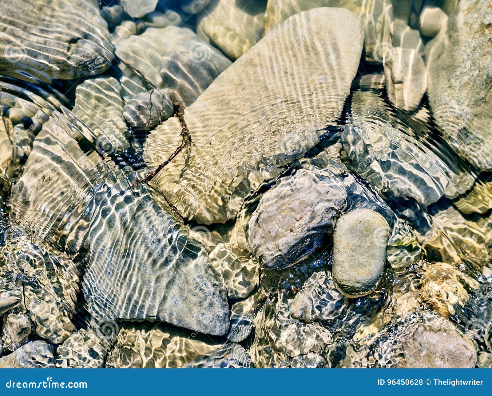 Rocks, River Pebbles in a Streaming Water Stock Photo - Image of ...