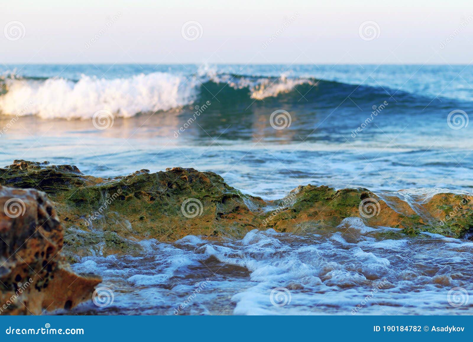 Rocks and Rolling Wave at Background Stock Photo - Image of breaking ...