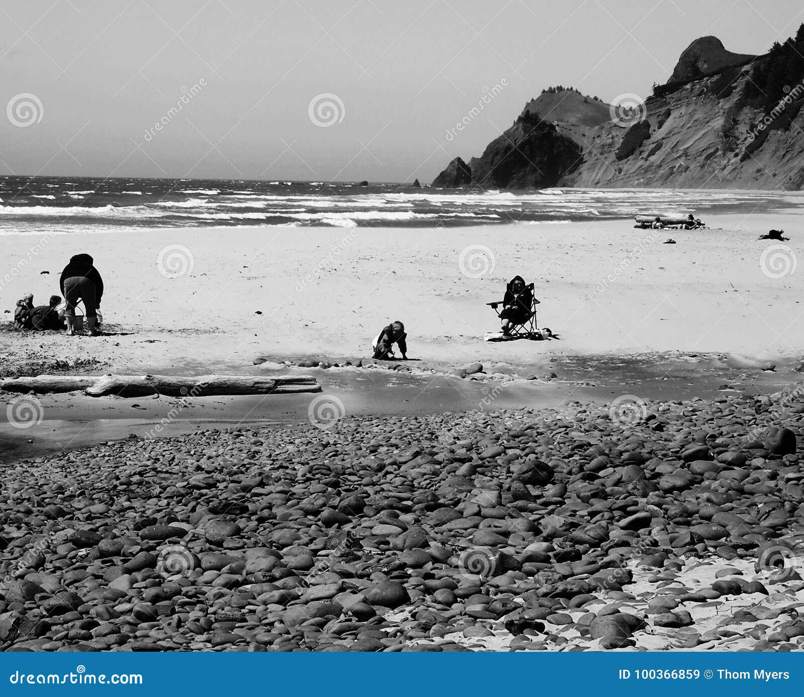 Rocks, sand, people, ocean editorial stock image. Image of sand - 100366859
