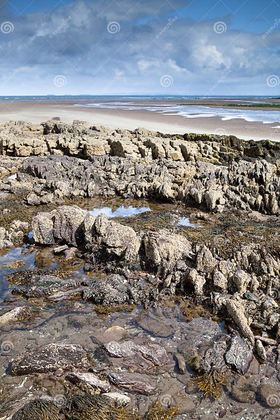 Rocks on Sandy Beach and Blue Sky Clouds Stock Photo - Image of beauty ...