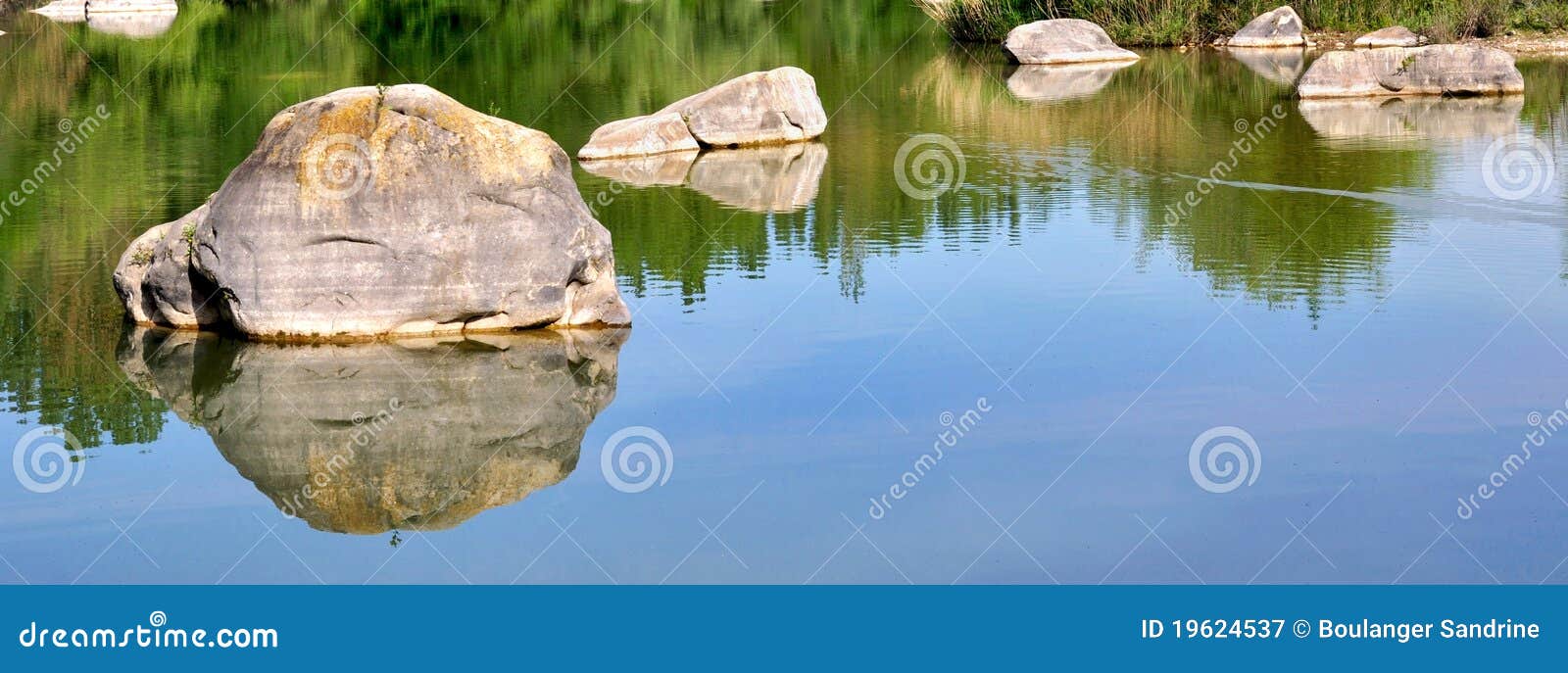 Rocks Scattered in the Lake Water Stock Image - Image of reflecting ...