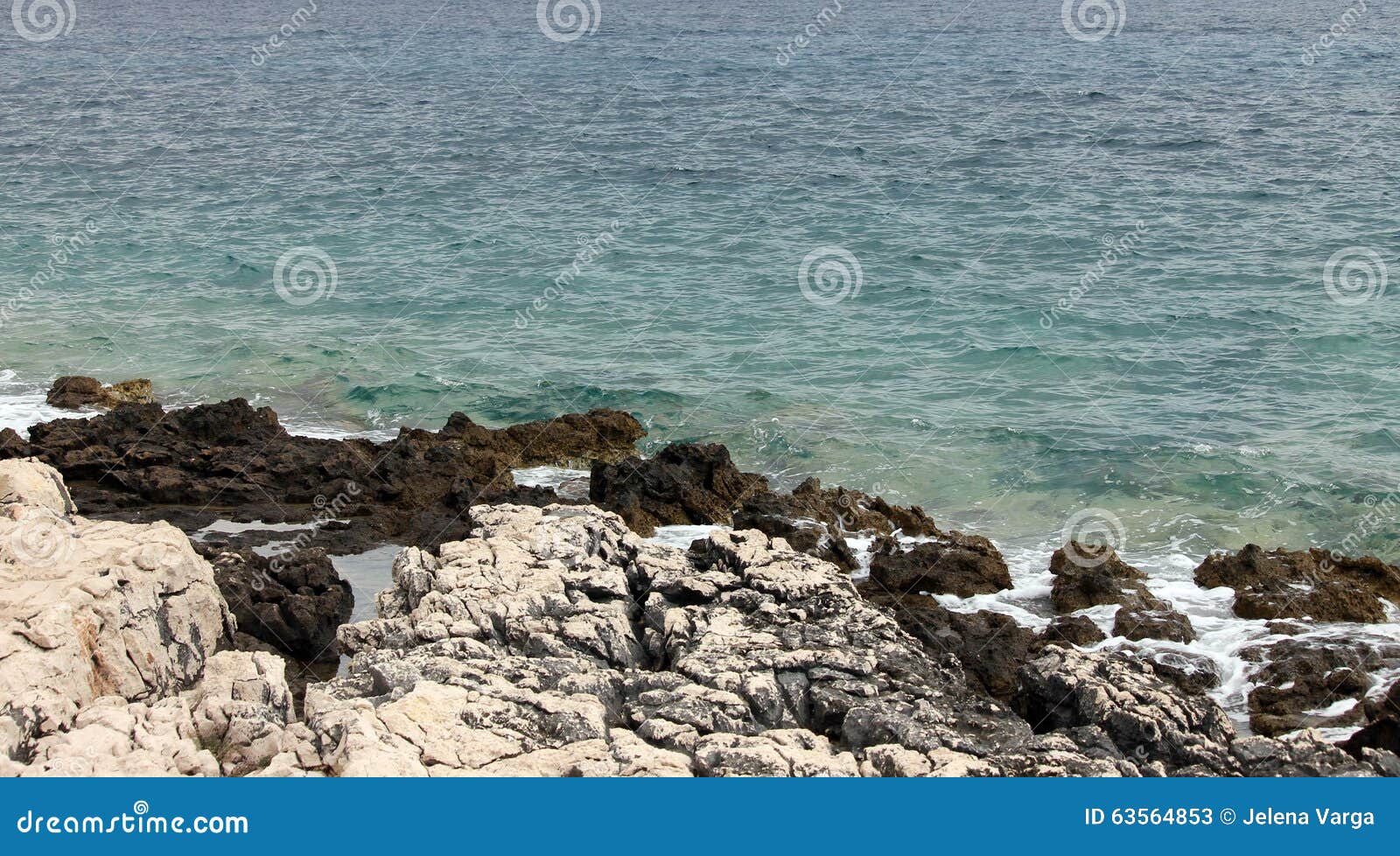 Rocks at sea stock image. Image of pacific, daytime, aqua - 63564853