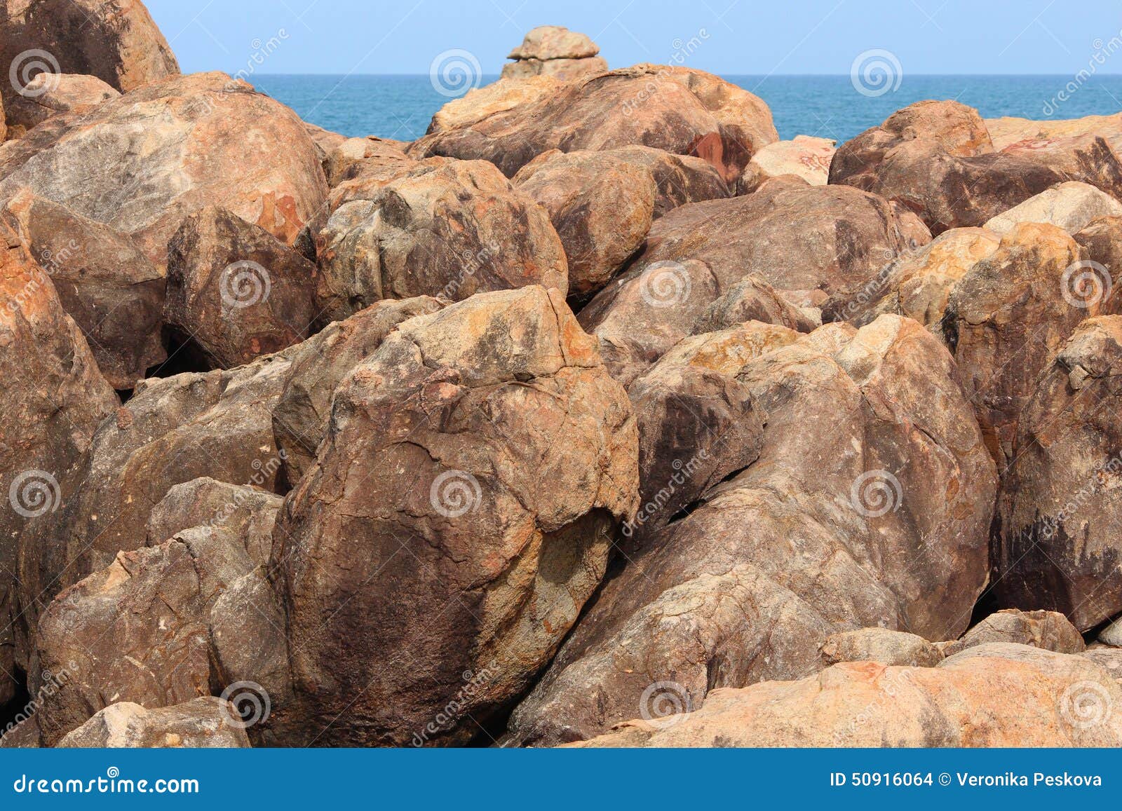 Rocks , sea and blue sky stock photo. Image of natural - 50916064
