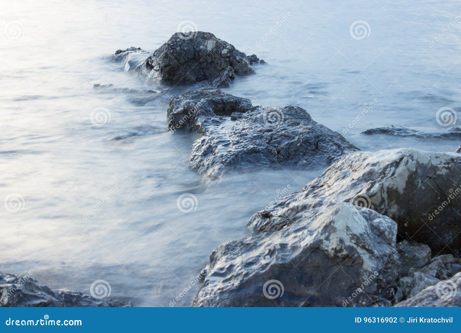 Rocks in the sea stock photo. Image of paradise, scene - 96316902