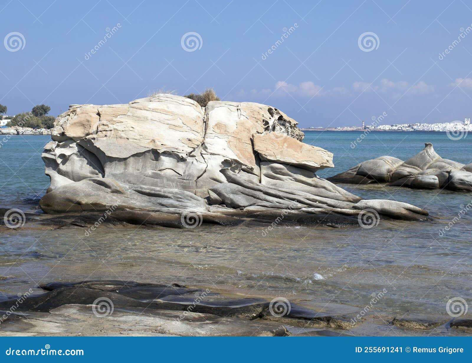 Rocks in the sea stock image. Image of rock, blue, rocks - 255691241