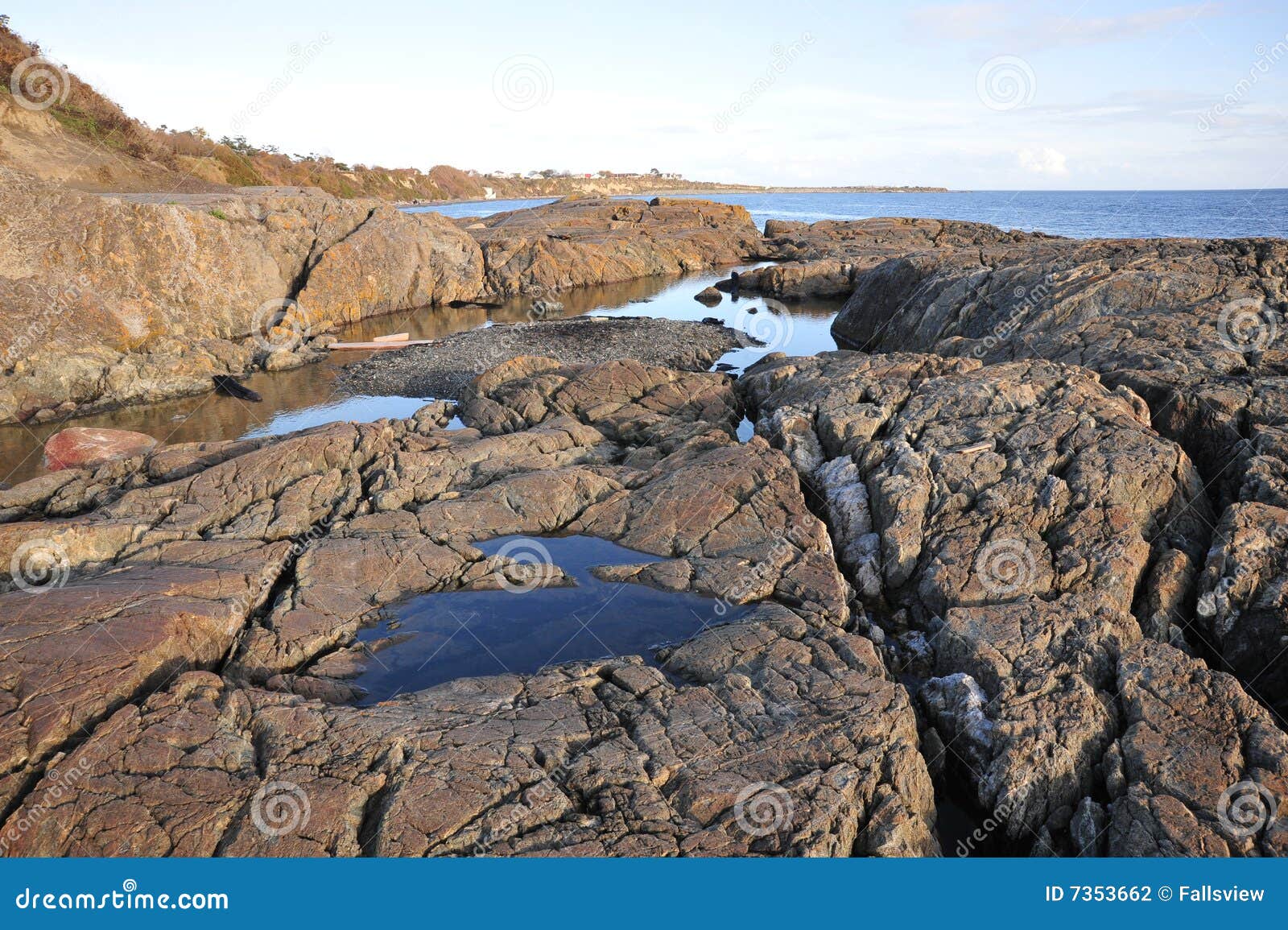 Rocks on sea shore stock photo. Image of scenic, dusk - 7353662