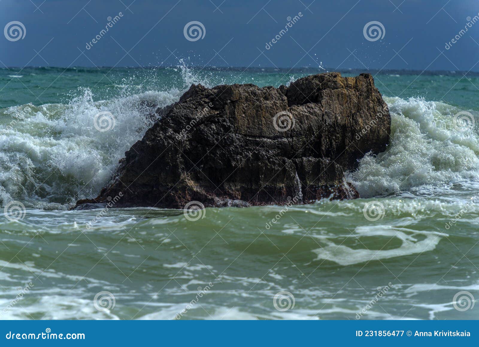 Rocks in the sea and waves stock image. Image of rough - 231856477