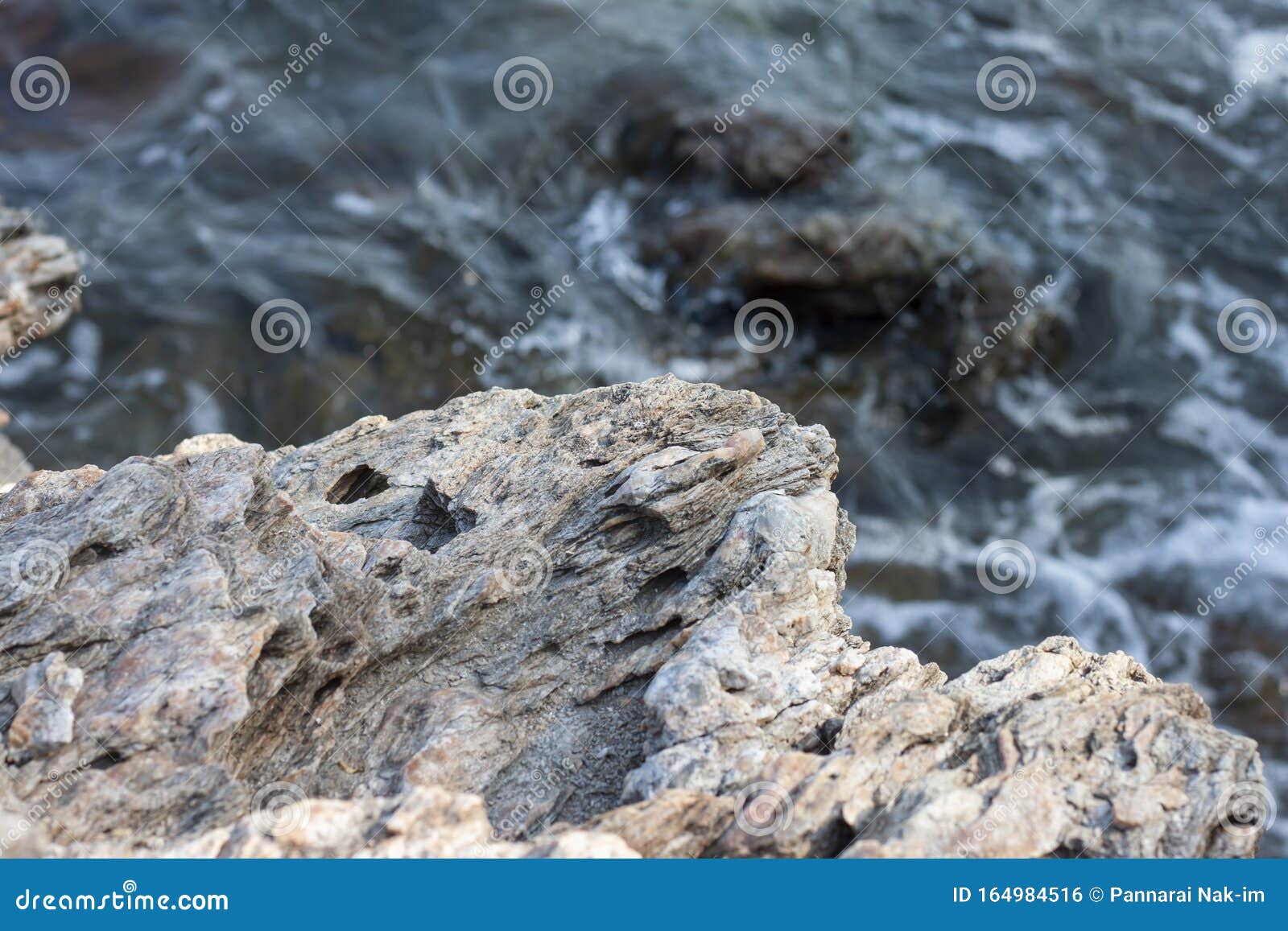 The Rocks at the Seashore and the Waves that Washed Stock Photo - Image ...