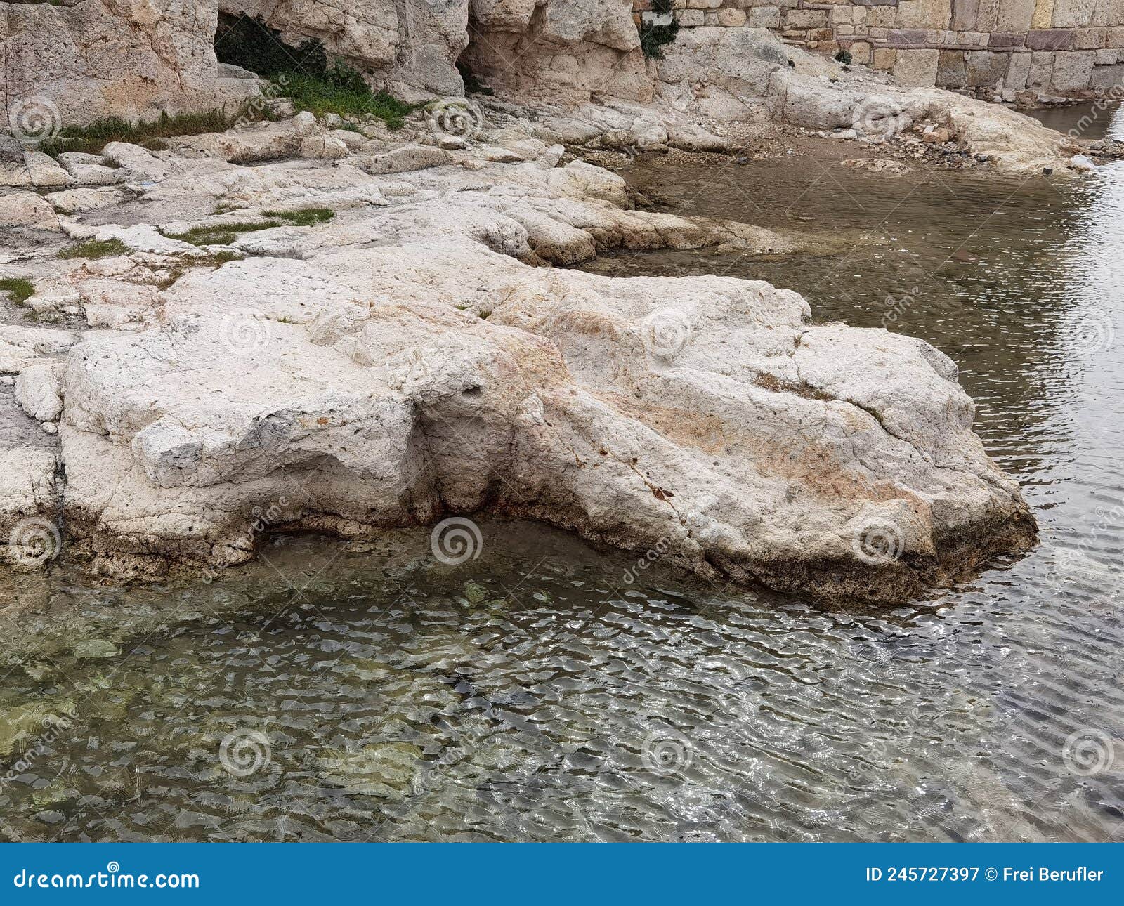 Rocks in Shallow Water with Clear Water Stock Image - Image of wall ...